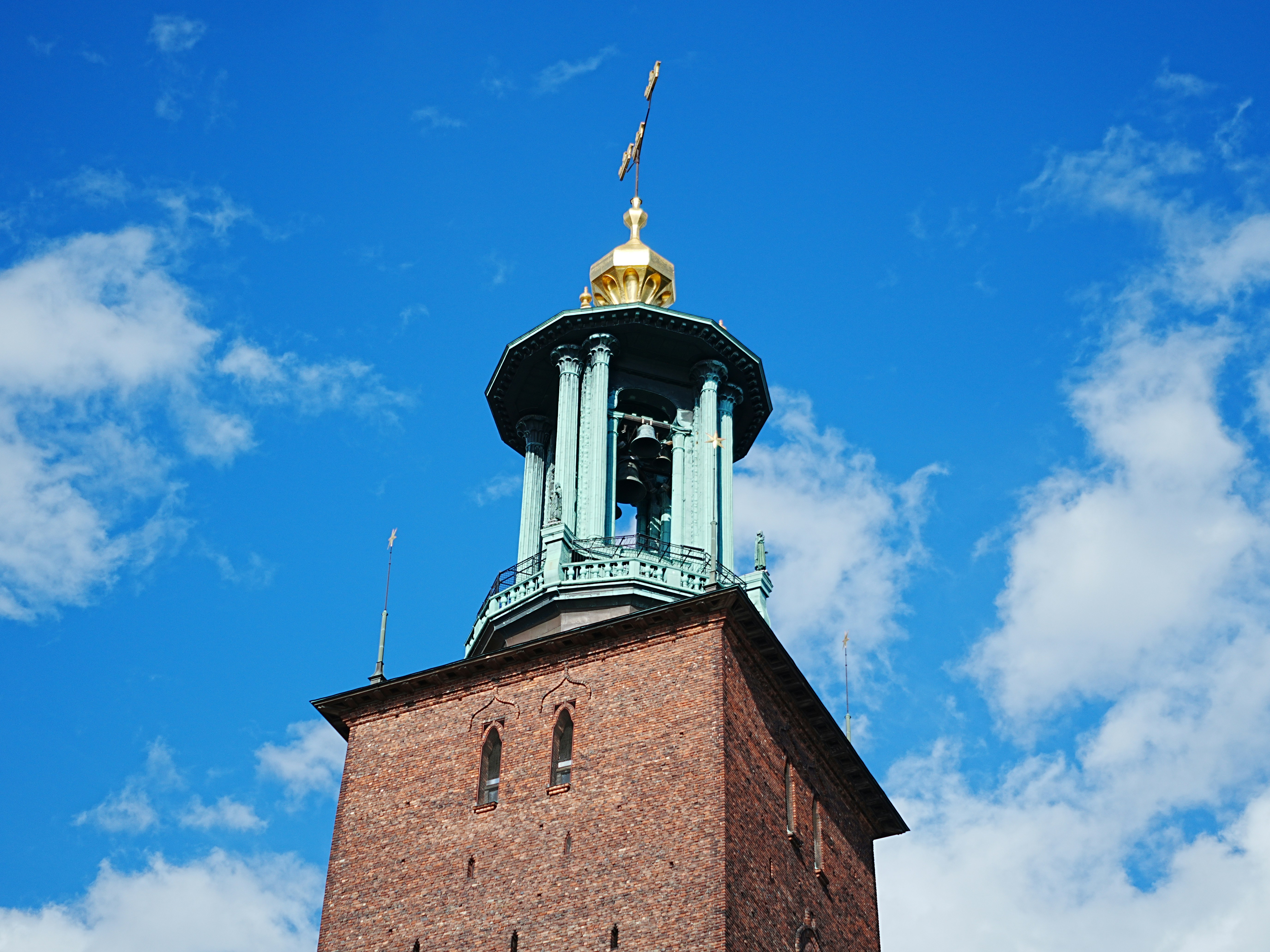 Clocktower Sentinel: Brick Tower Under a Bright Sky