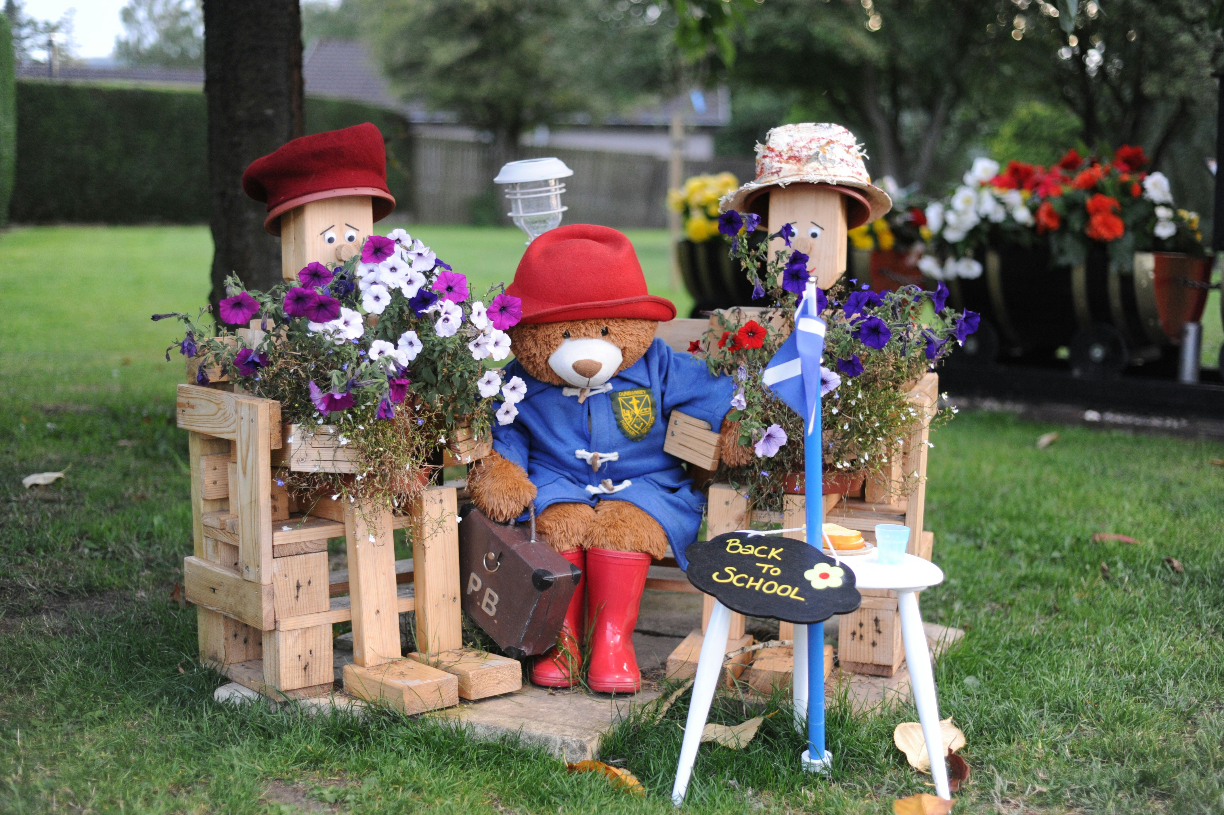 Garden Hankies: A Trio of Plush Entertainers in a Flowered Corner