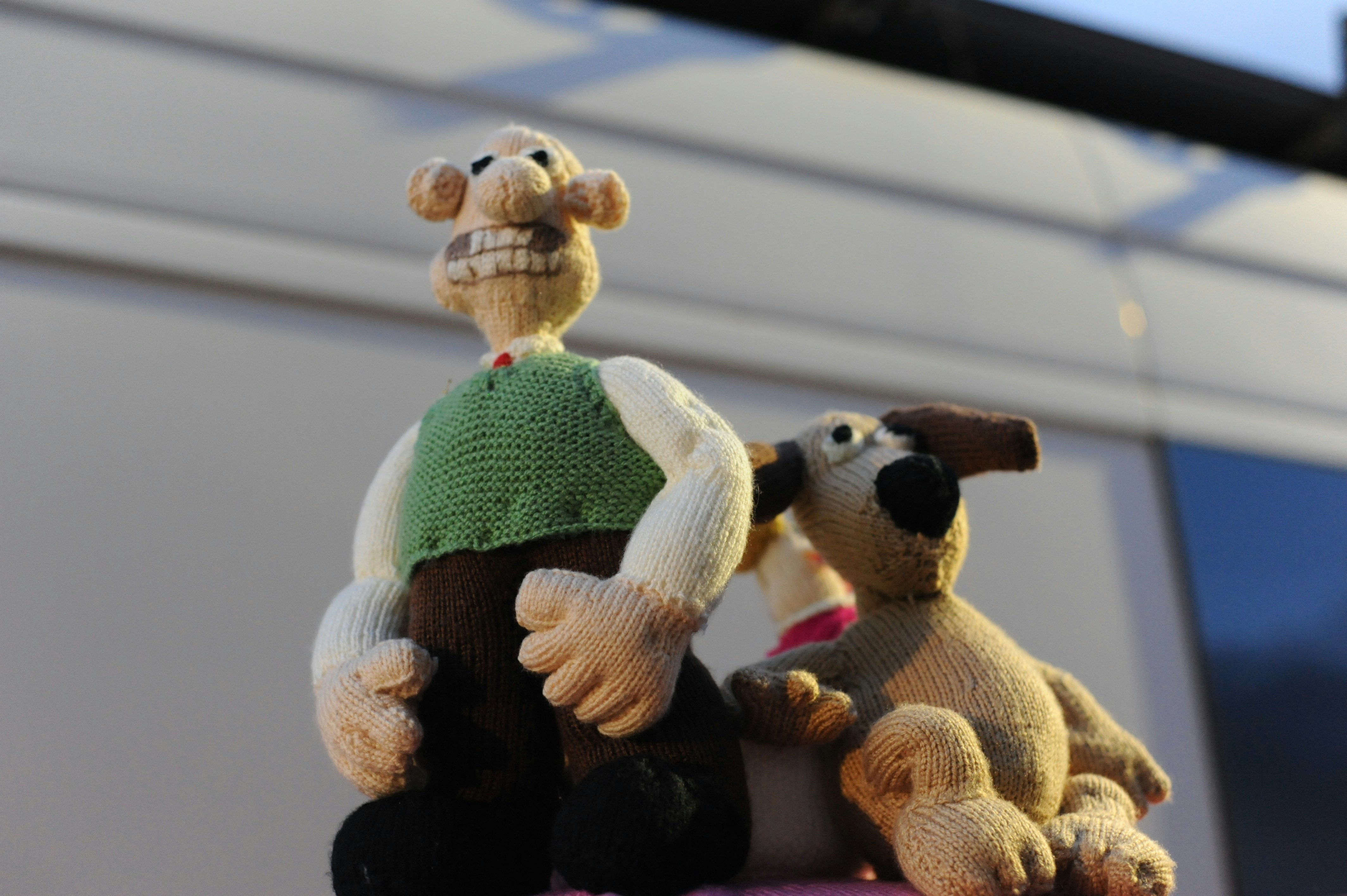 Rear-window Puppets: A Grinning Bear and Loyal Dog