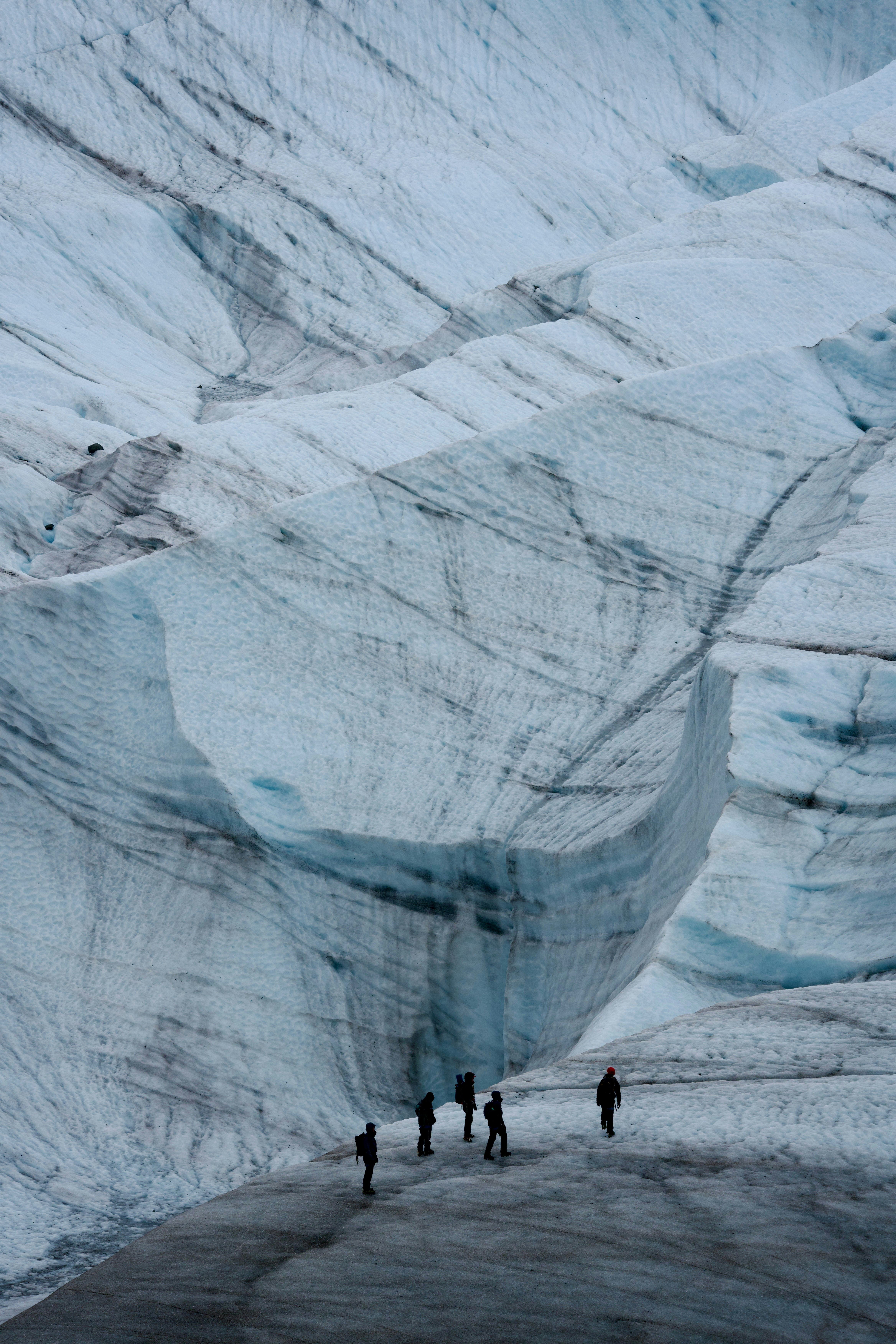 Cracked Blue Silence: A Threshold Along the Glacier Path