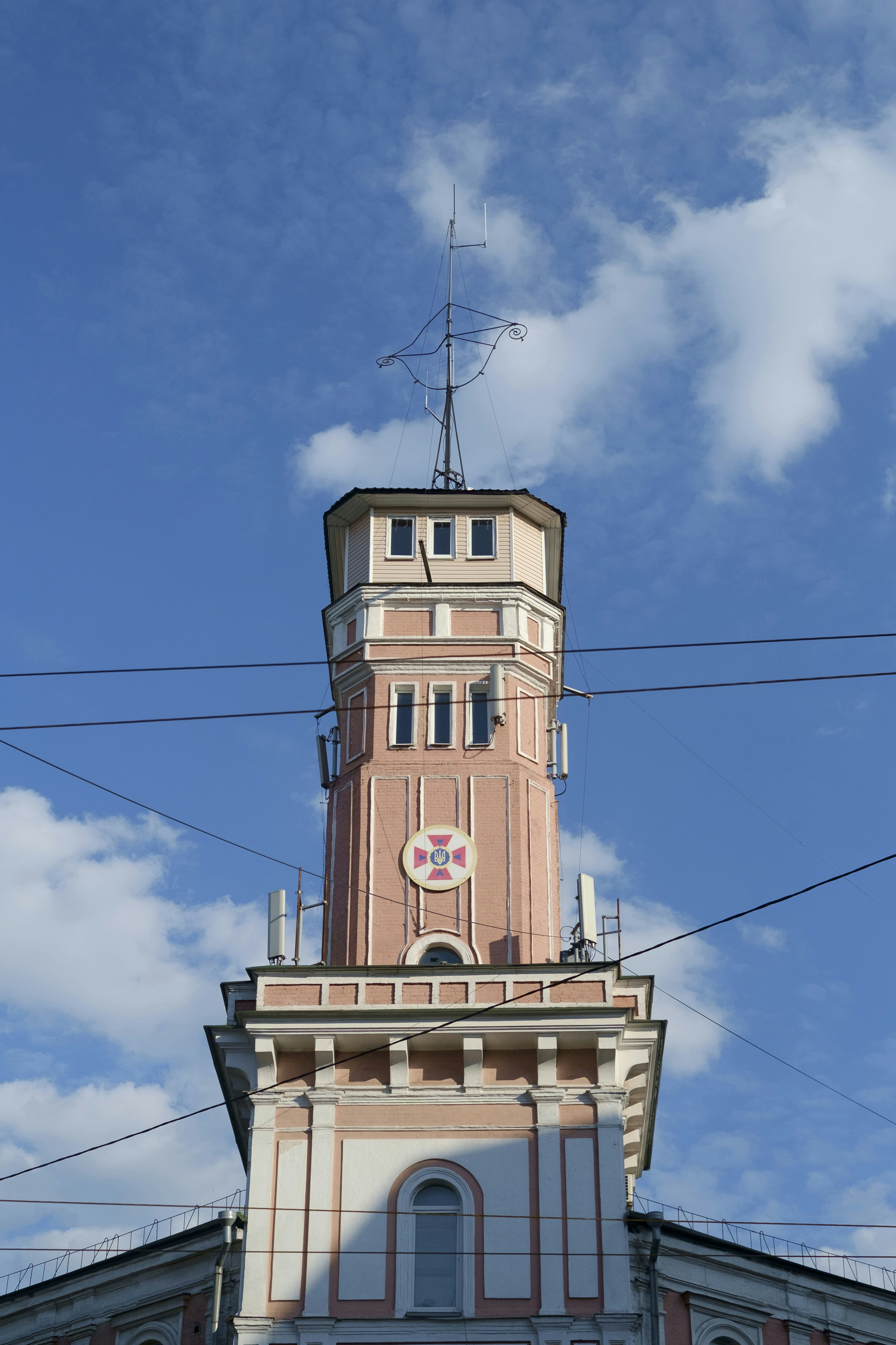 Brick Clock Tower Reaches Toward a Bright Sky
