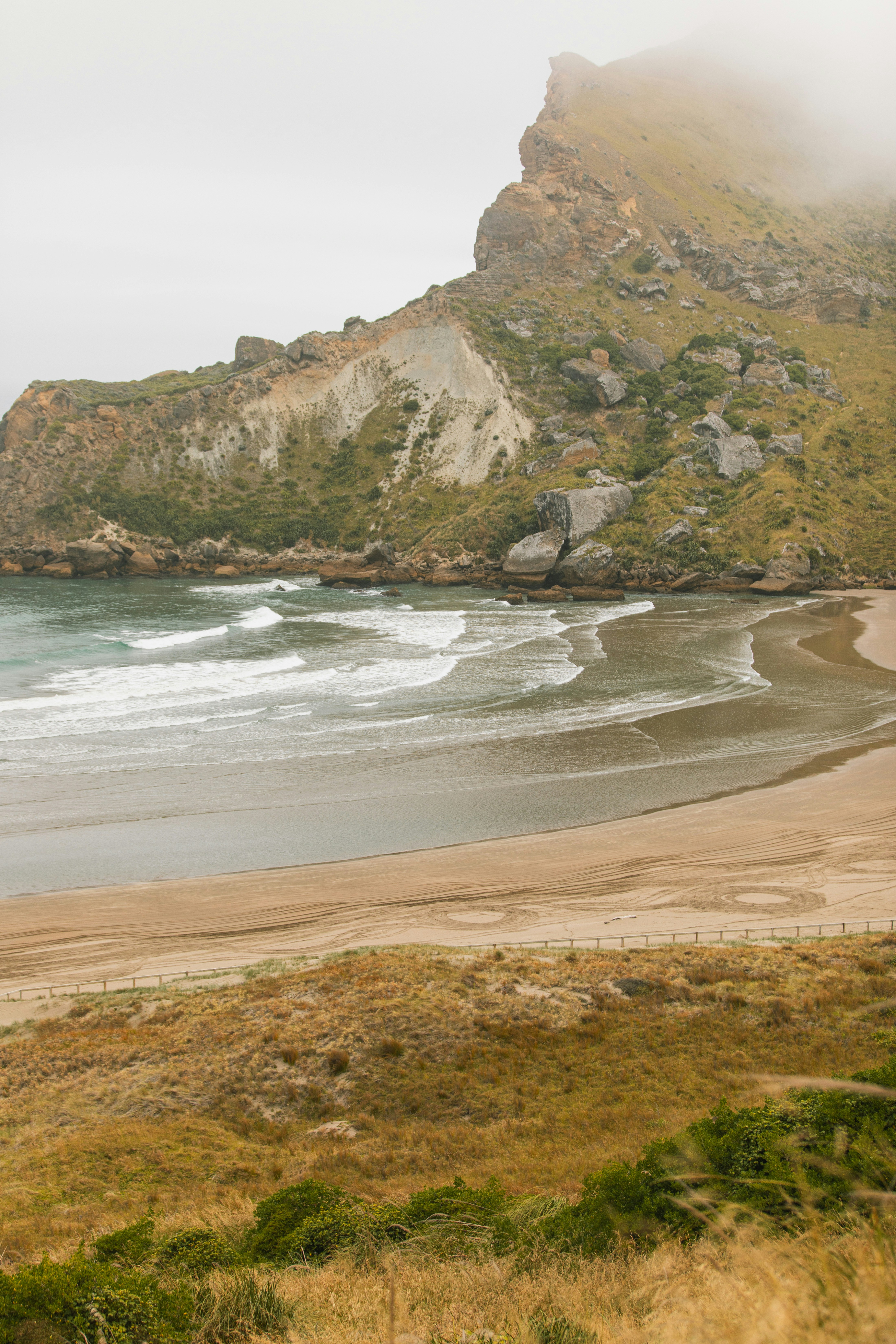 Cliff and Cove Under Quiet Mist