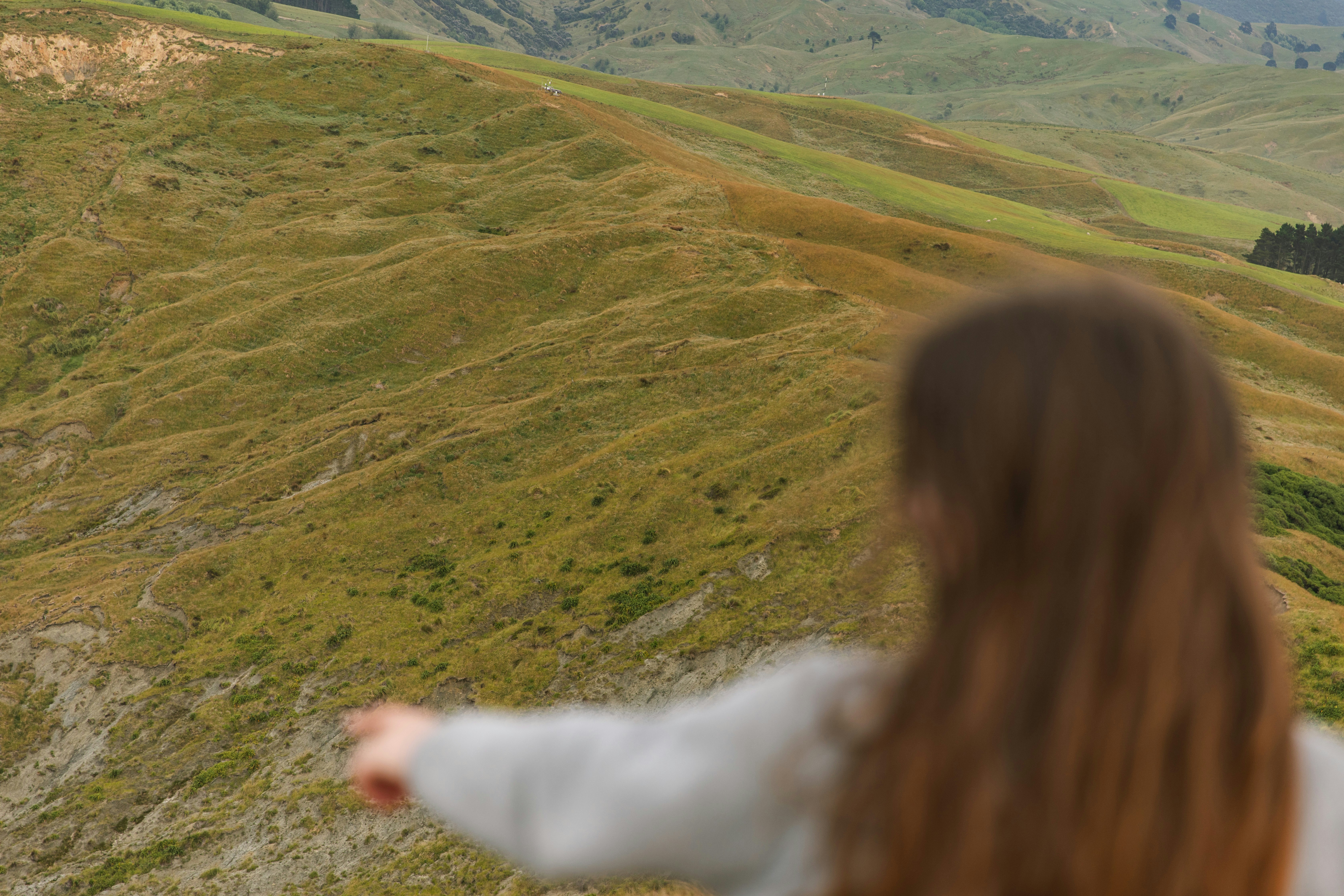 Outstretched Moment Over Rolling Hills