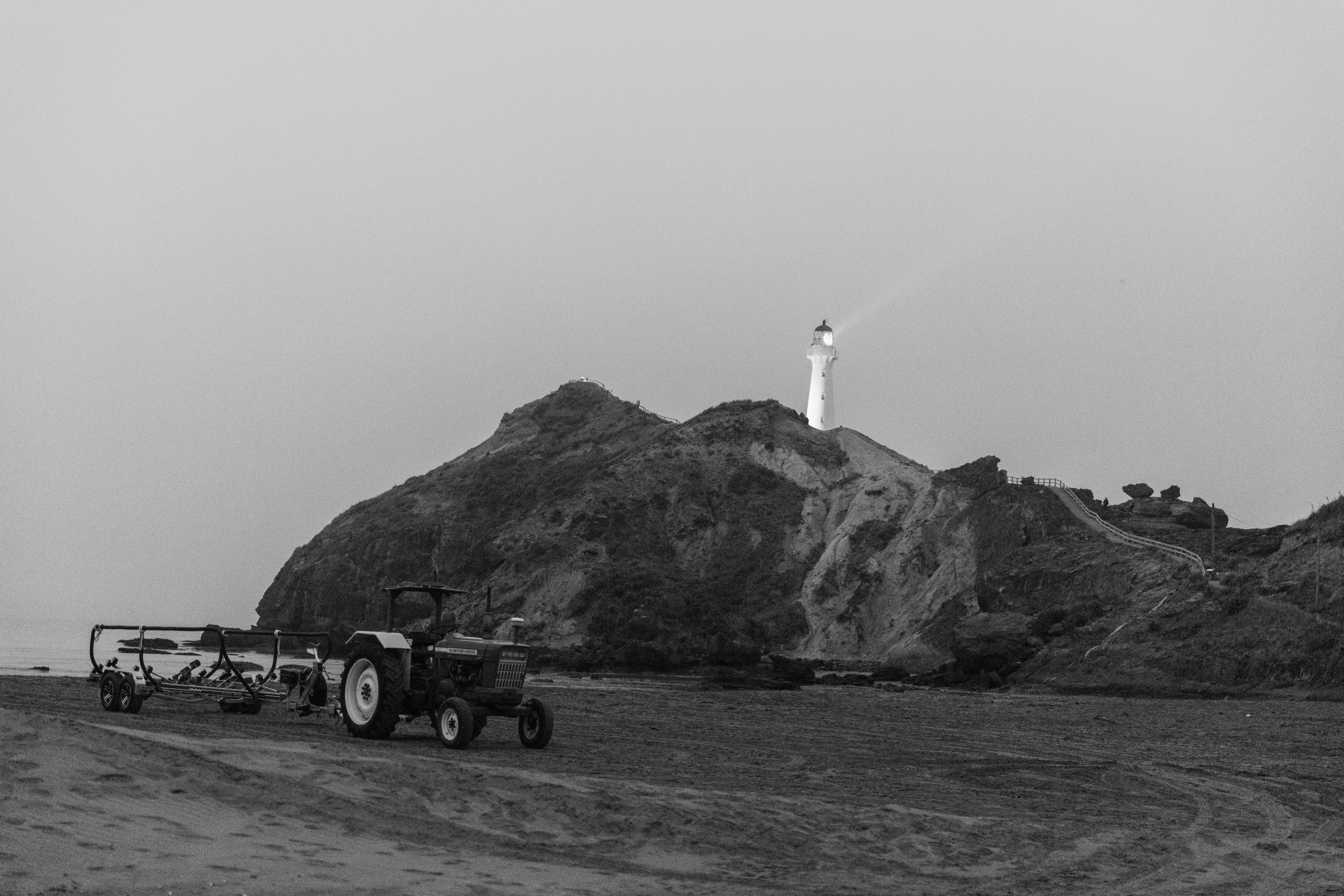 Lighthouse Sentinel over a Quiet Coastal Plain