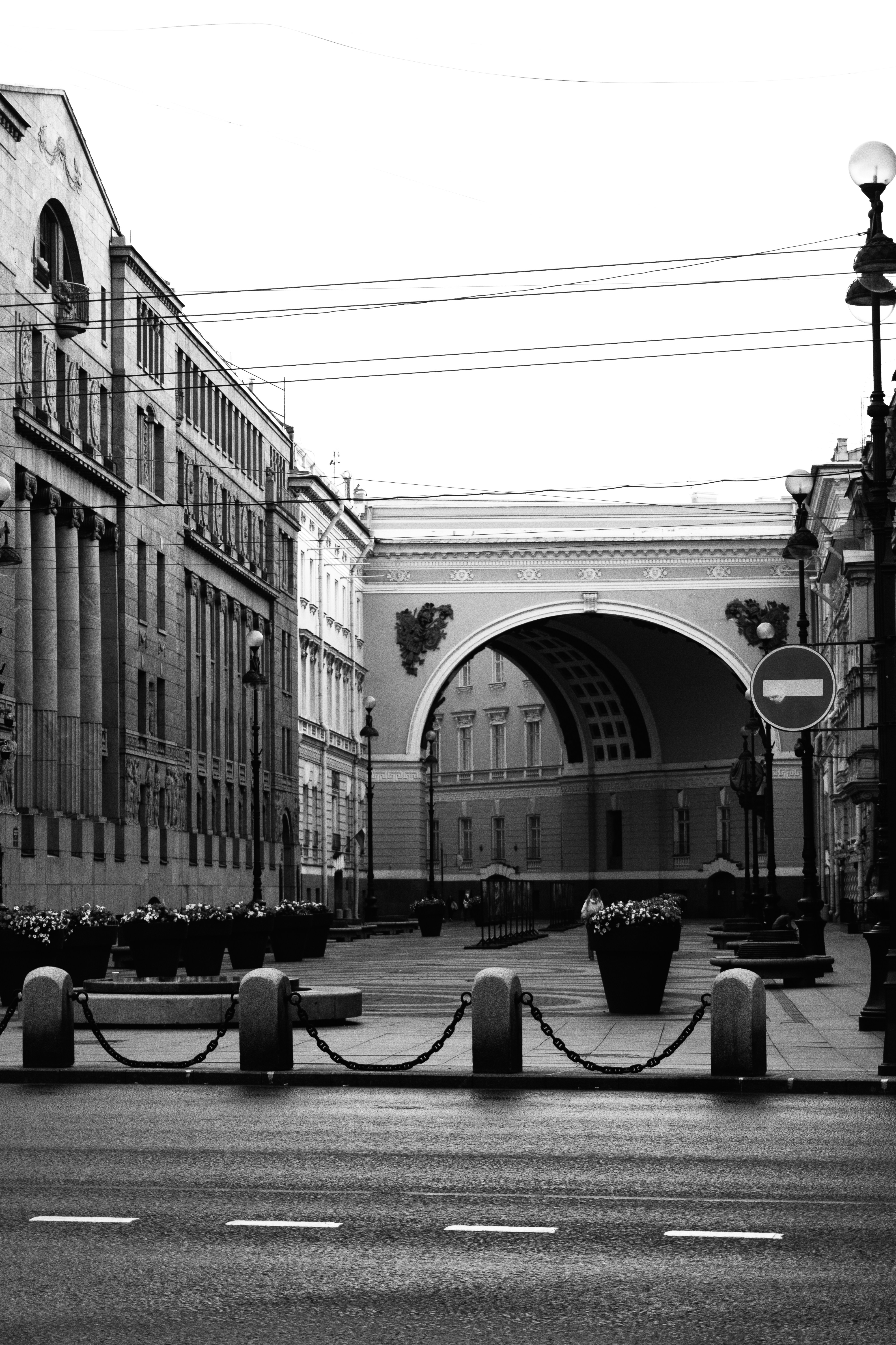 Archway Silence: A Monochrome Street Bites Into the City