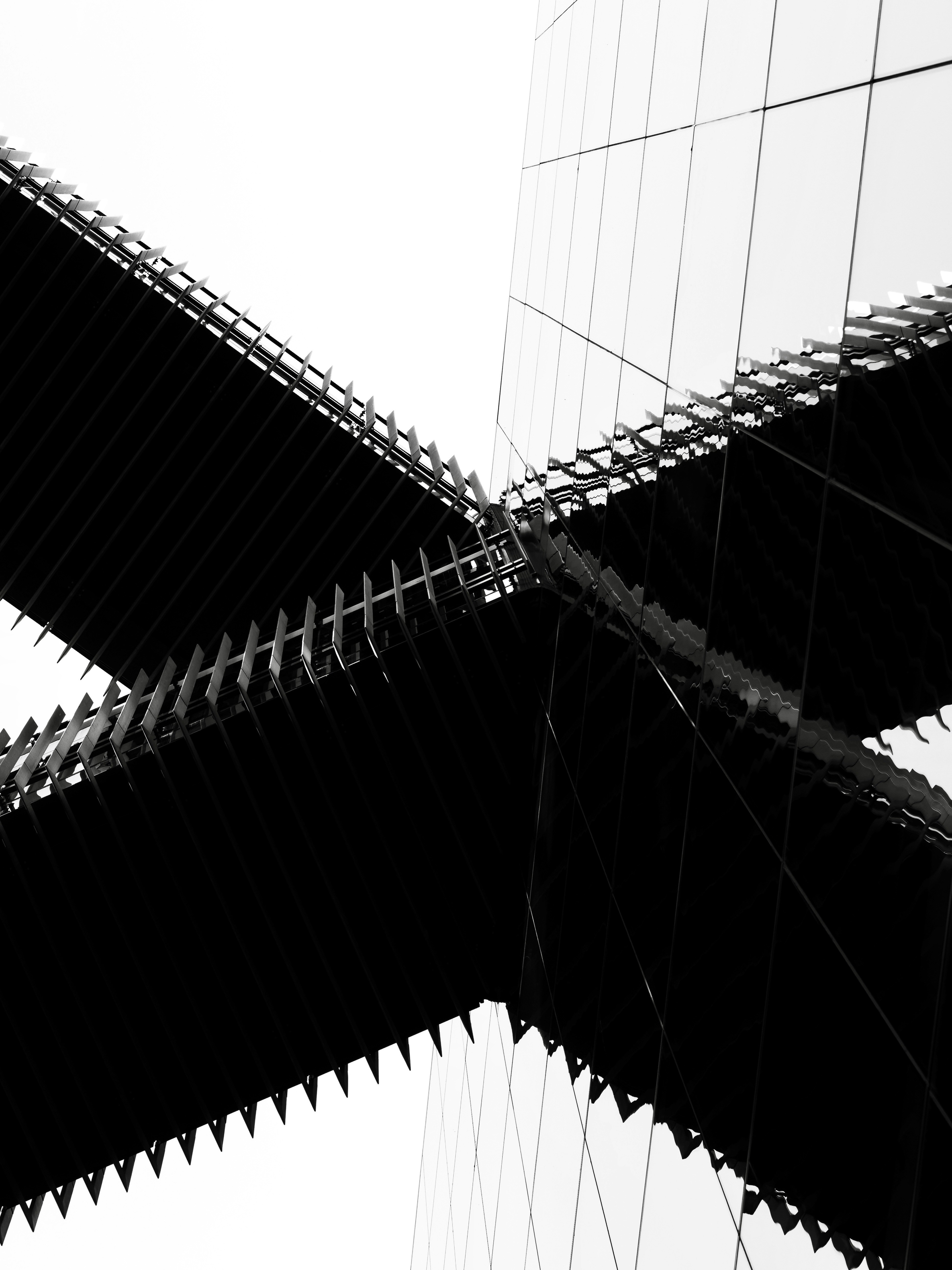 Crossed Edges: A Dance of Glass and Steel