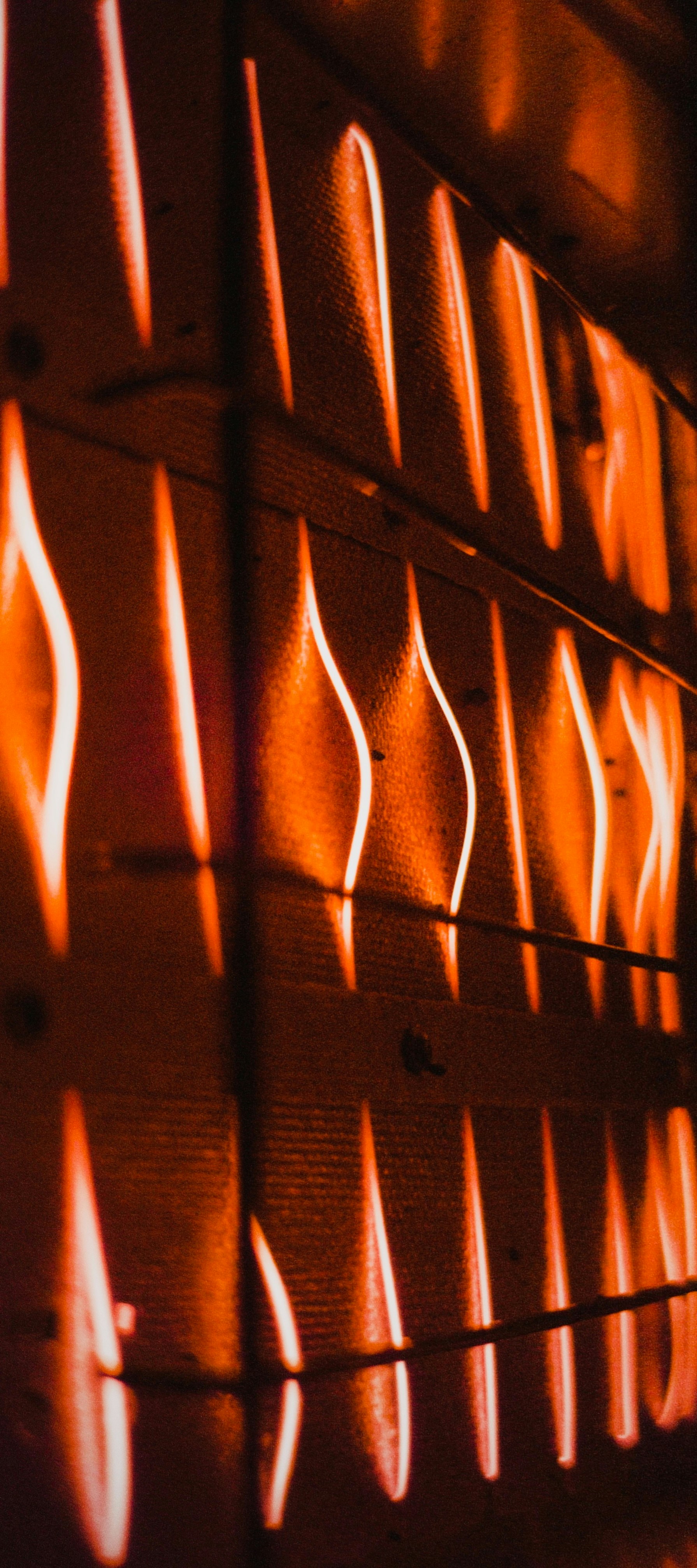 Glowing Ridges: Heat-stitched Panels in Neon Red