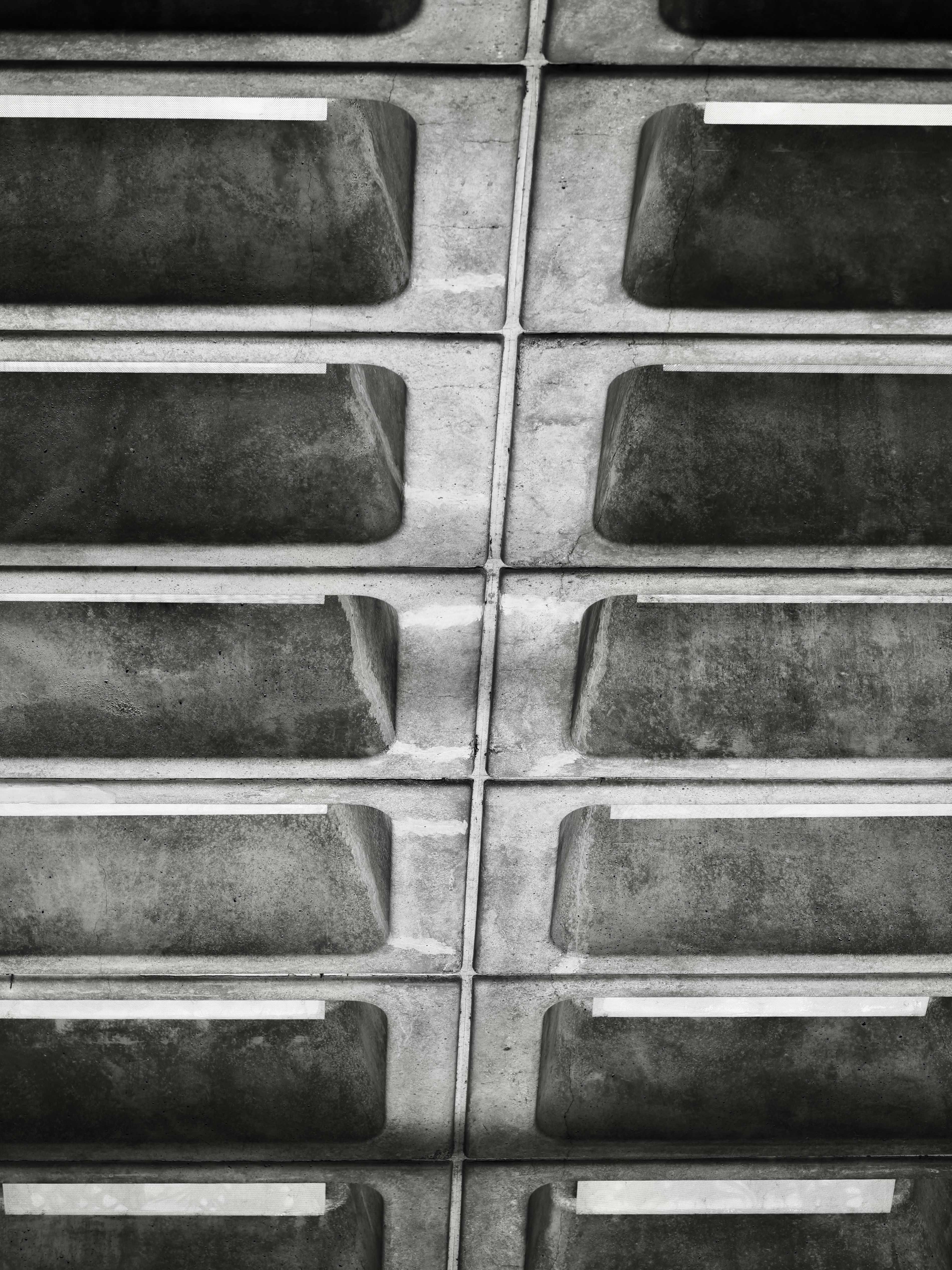 Industrial Echoes: A Monochrome Grid of Concrete Ridges