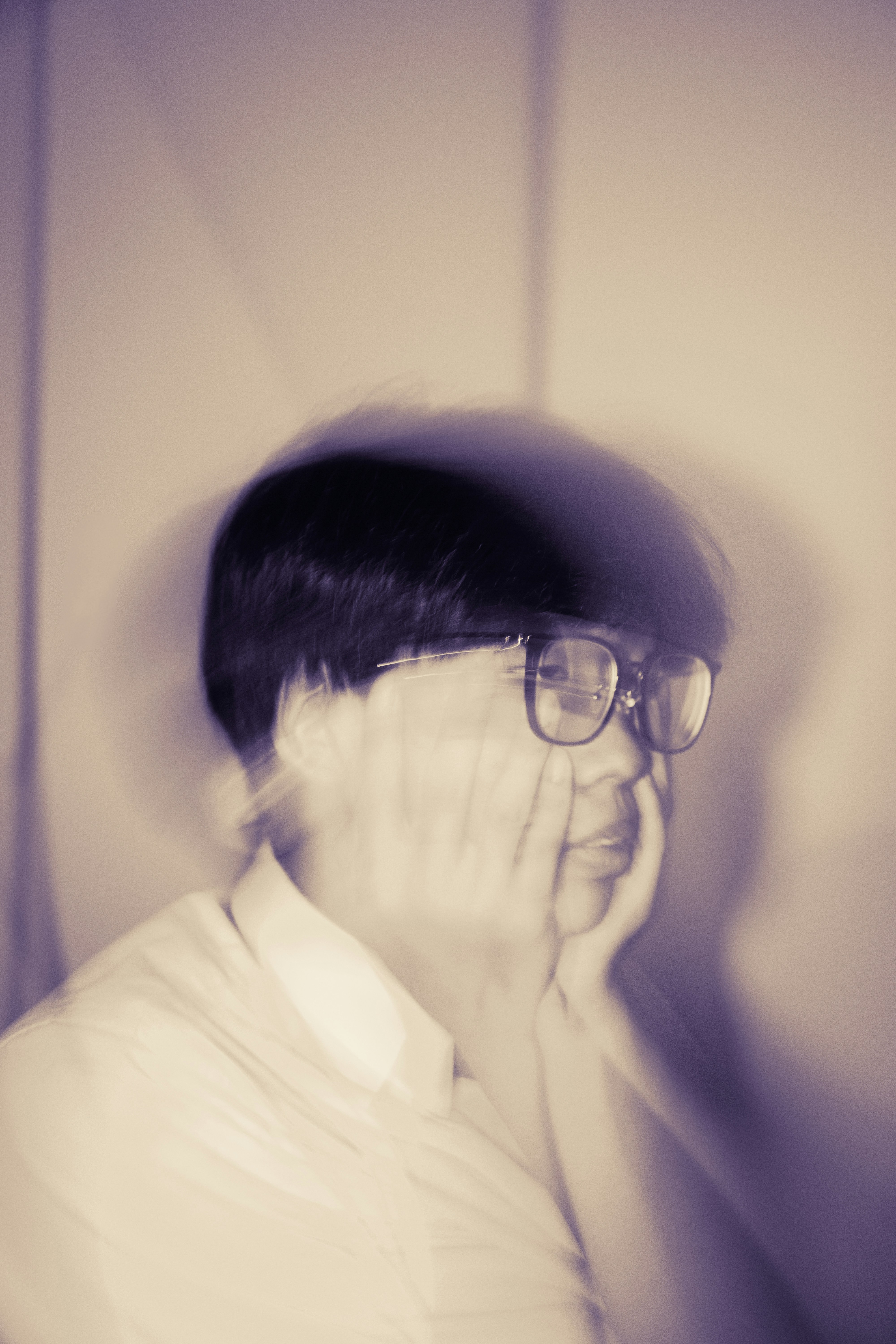Soft Blur Portrait: Whispered Laugh in Violet Tones