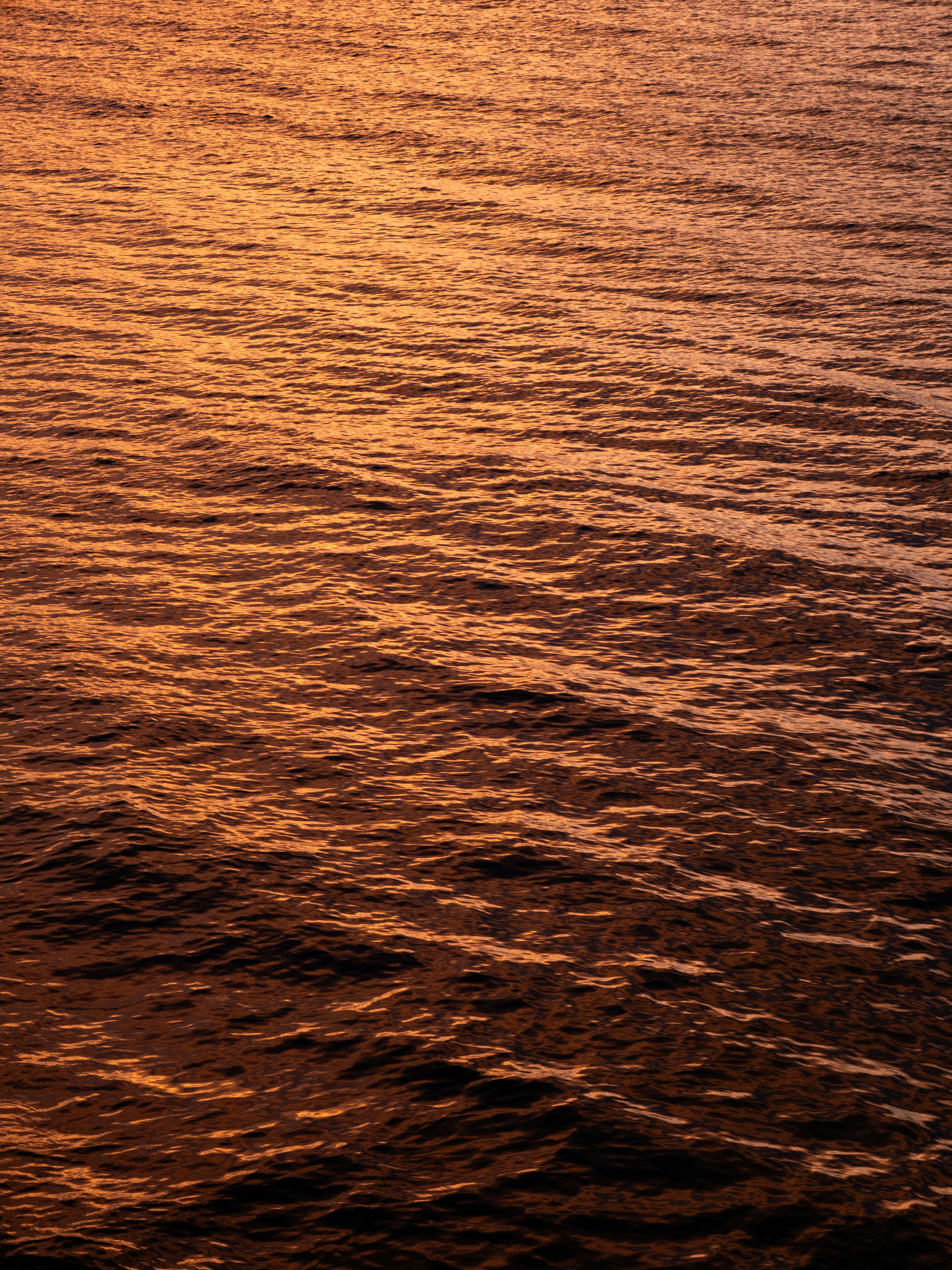 Orange Horizon: A Sea of Heat Amid Dusk