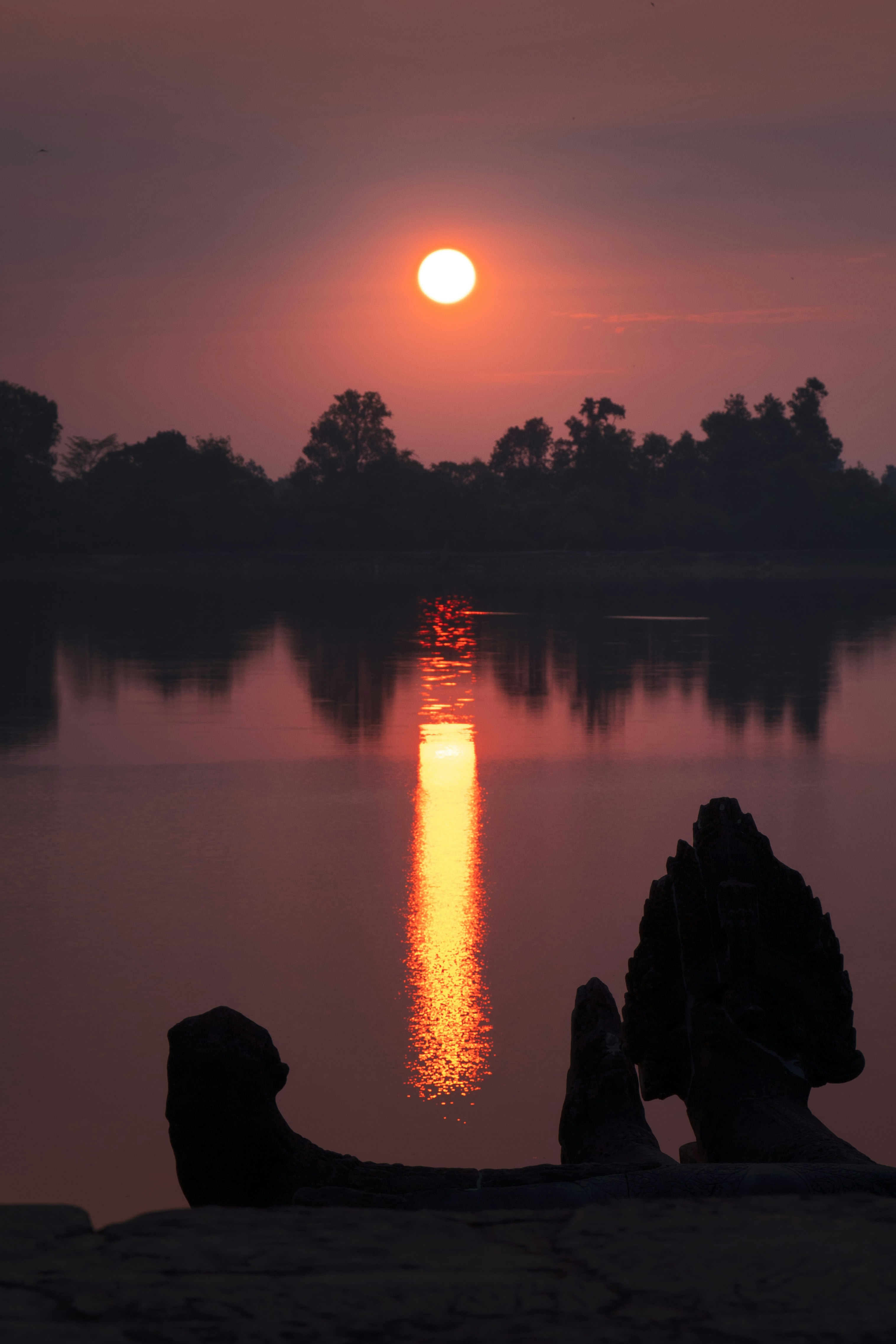 Sunset Pinnacle: The Silent Reflection of a Distant Peak