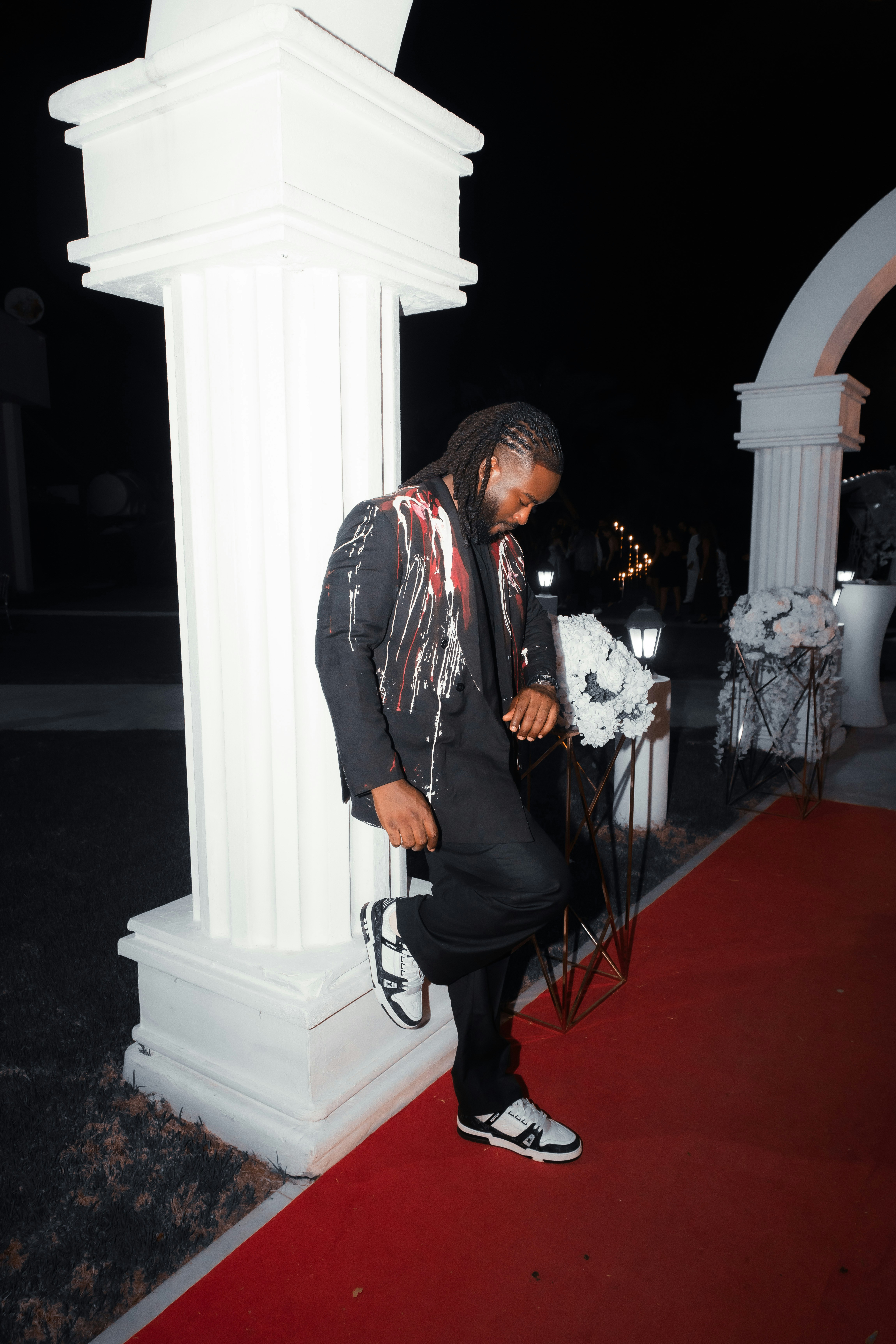 Stylistic Night Walk: A Dressed-Down Pose by White Columns