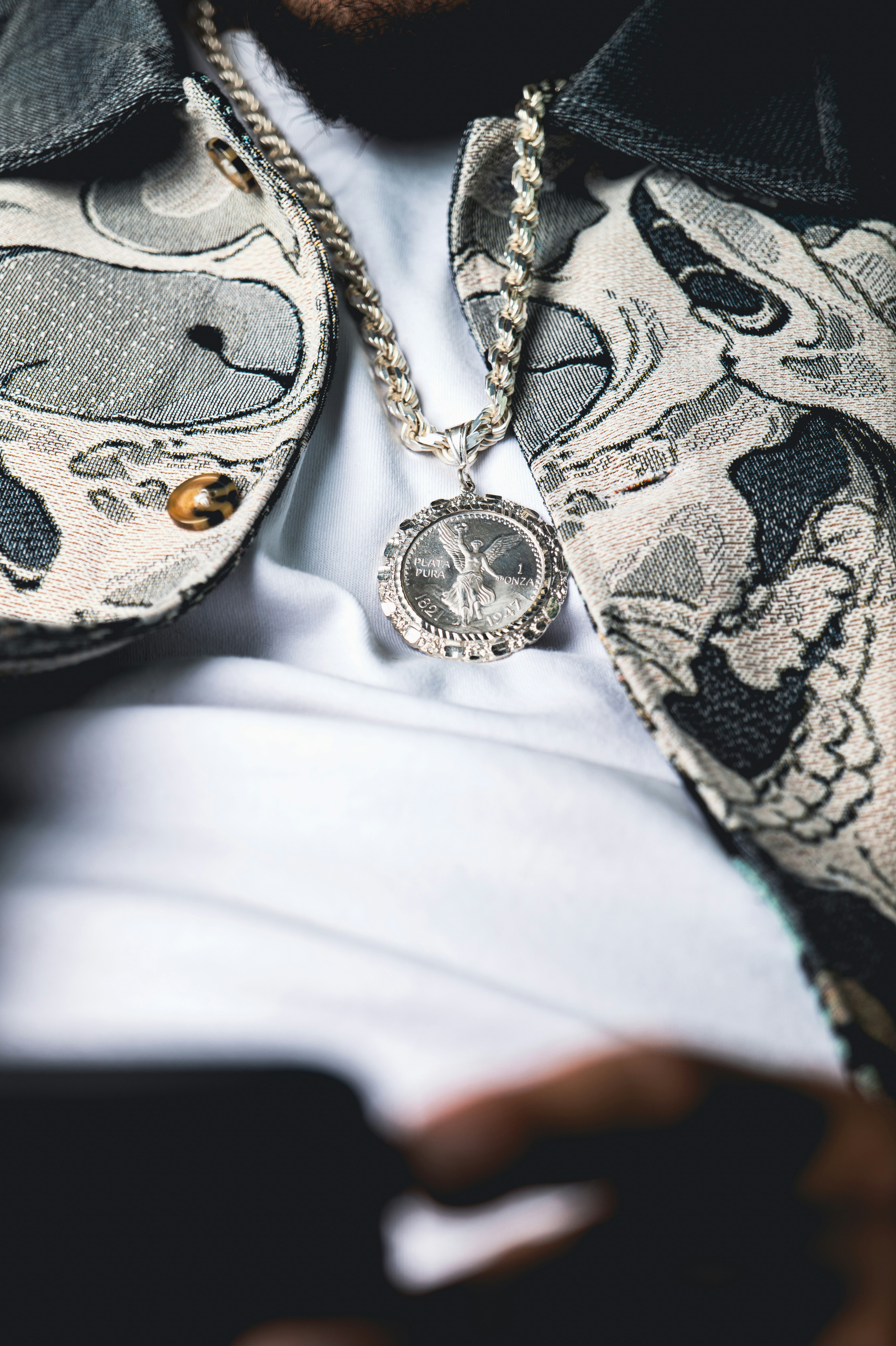 Chainmail Camouflage: A Close-Up of Texture and Pendant Detail
