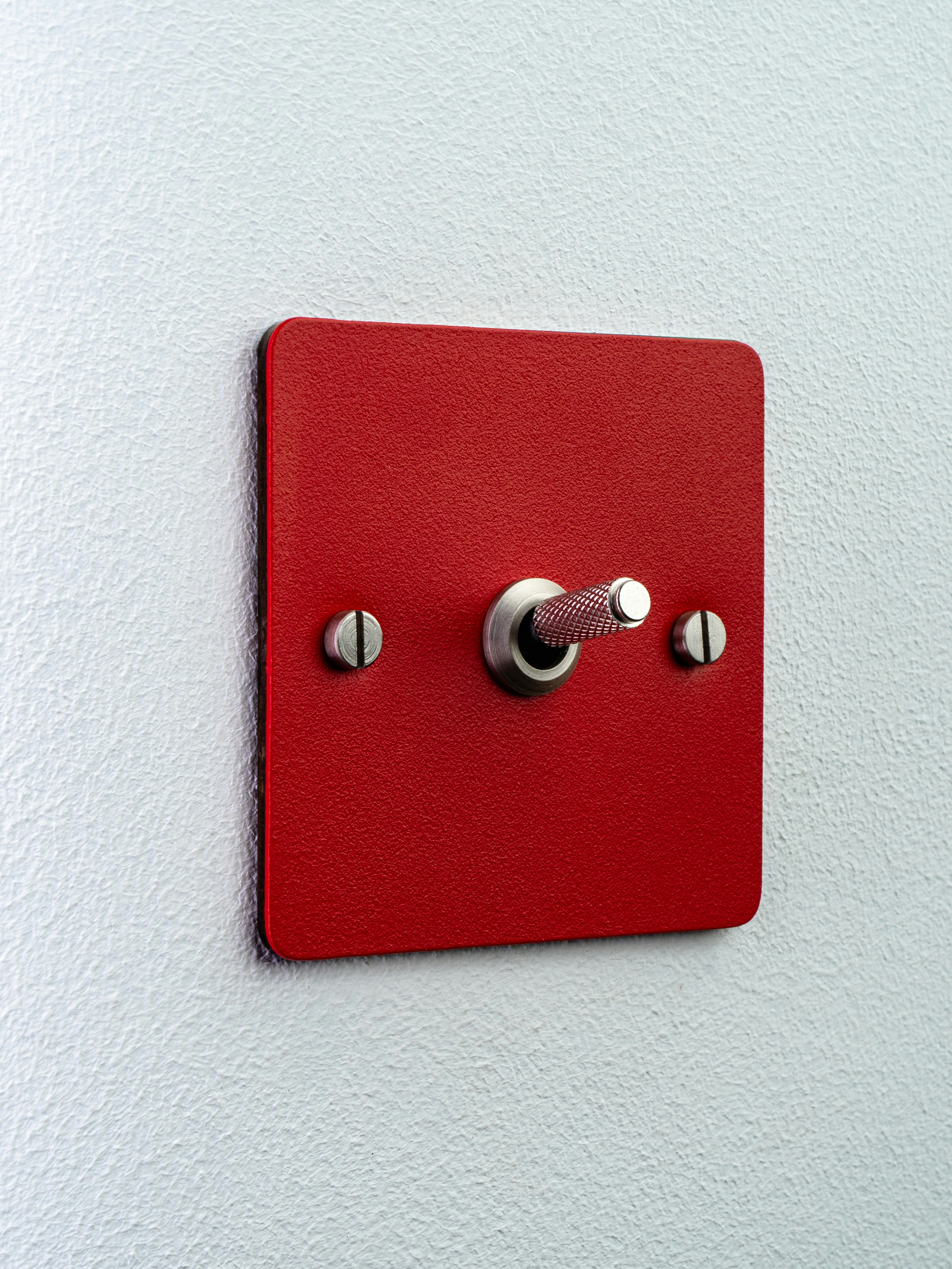 Red Lock: A Bold Wall Switch in Focus