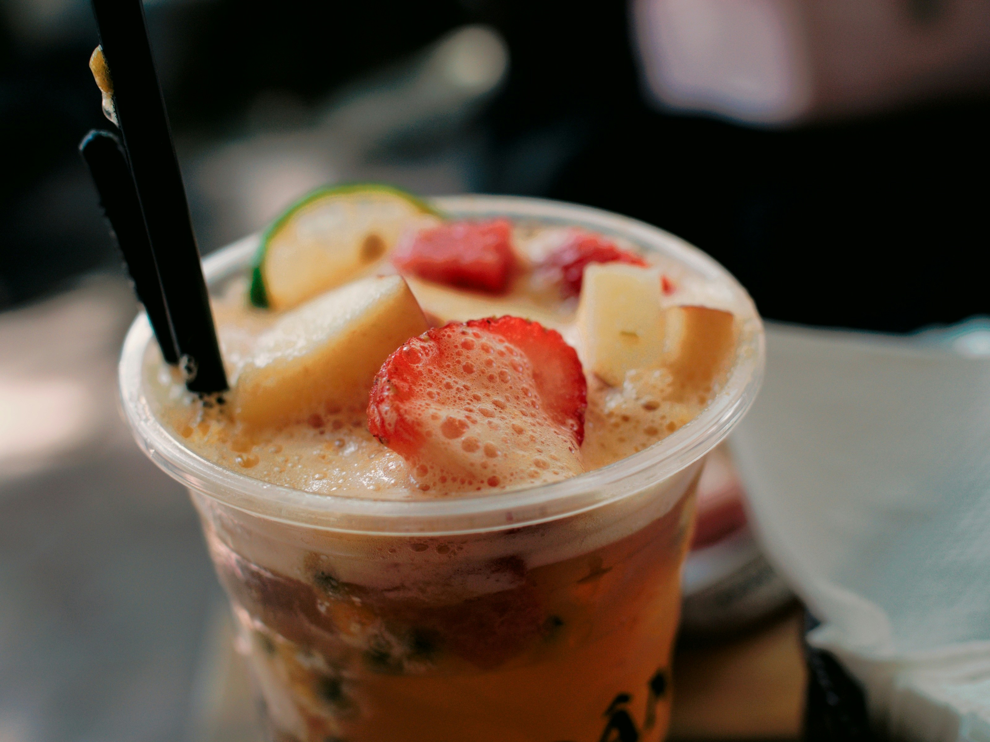 Sunny Strawberry Citrus Cooler in a Foam-Crowned Cup