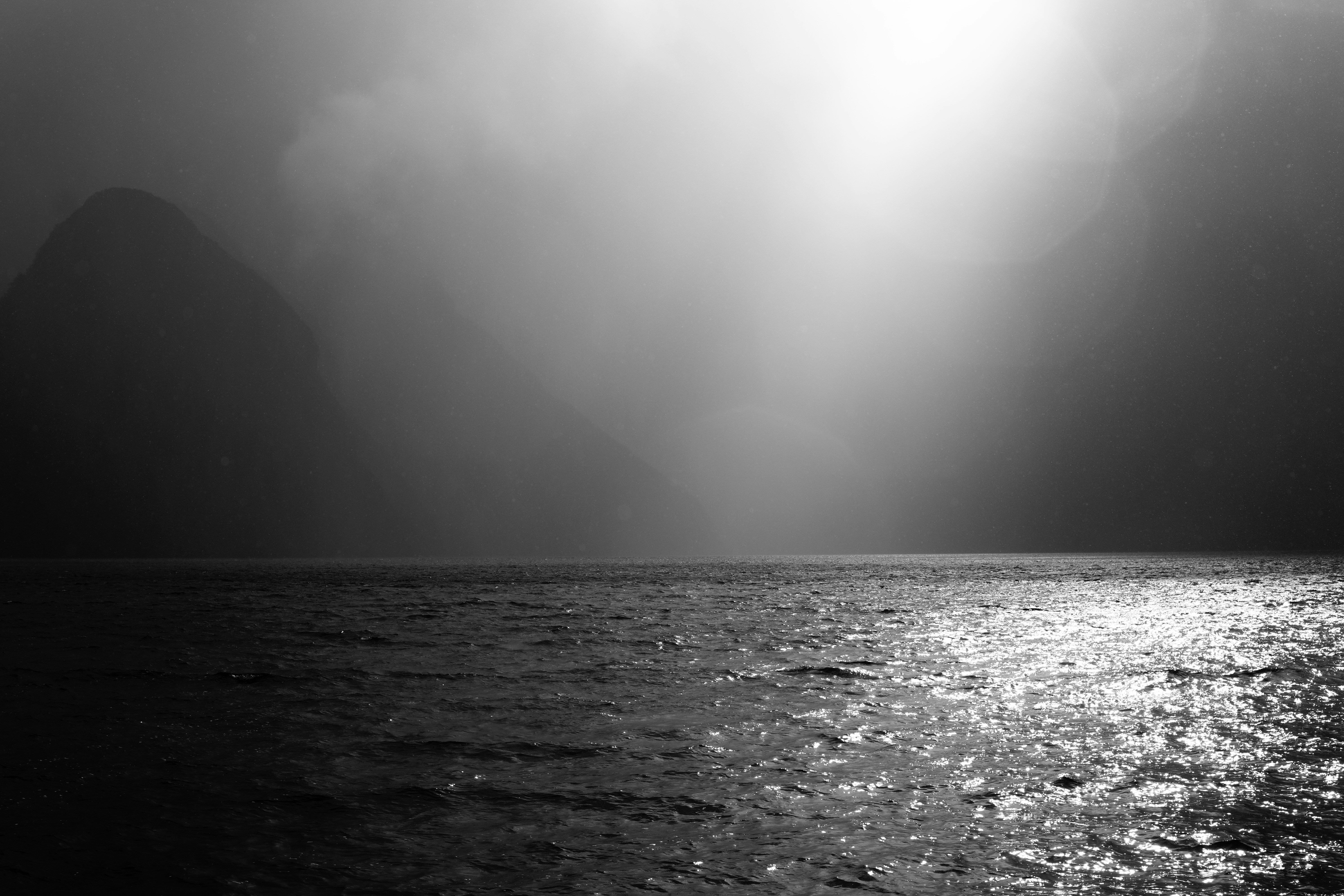 Moonlit Fjord: Silver Ripples and Shadowed Peaks