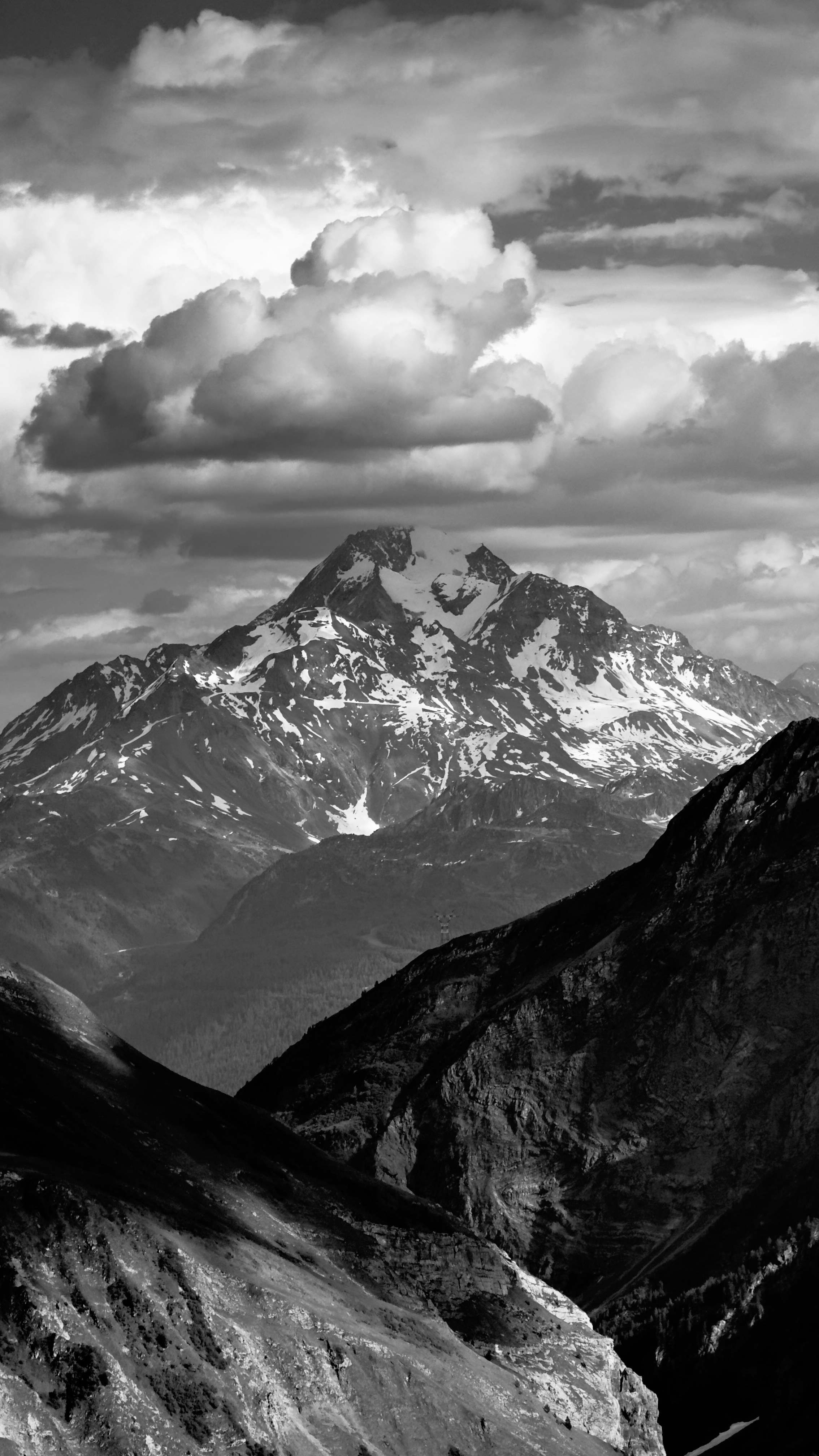 Peak Sentinel in Monochrome Clouds