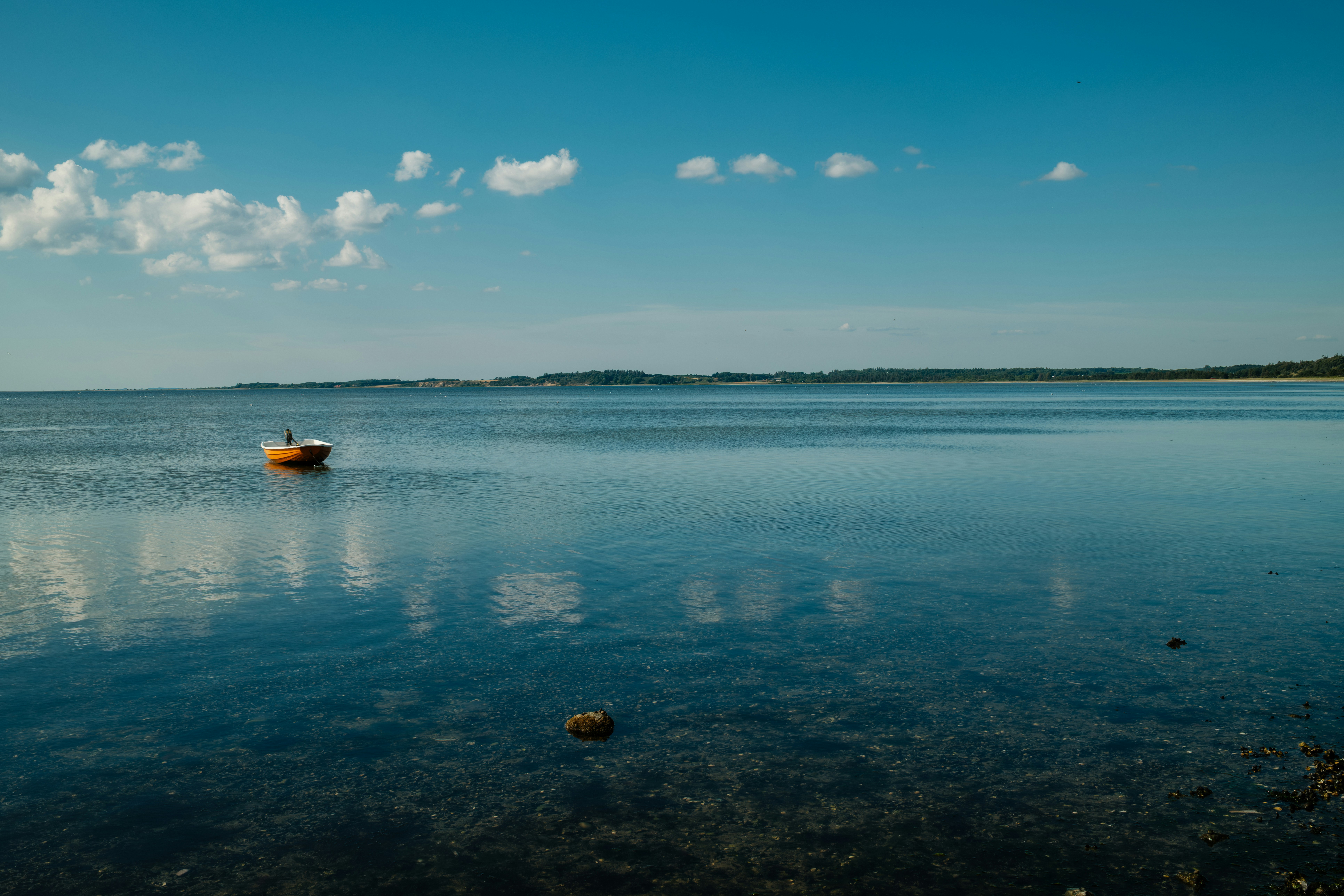 Distant Boat at Quiet Tidal Span