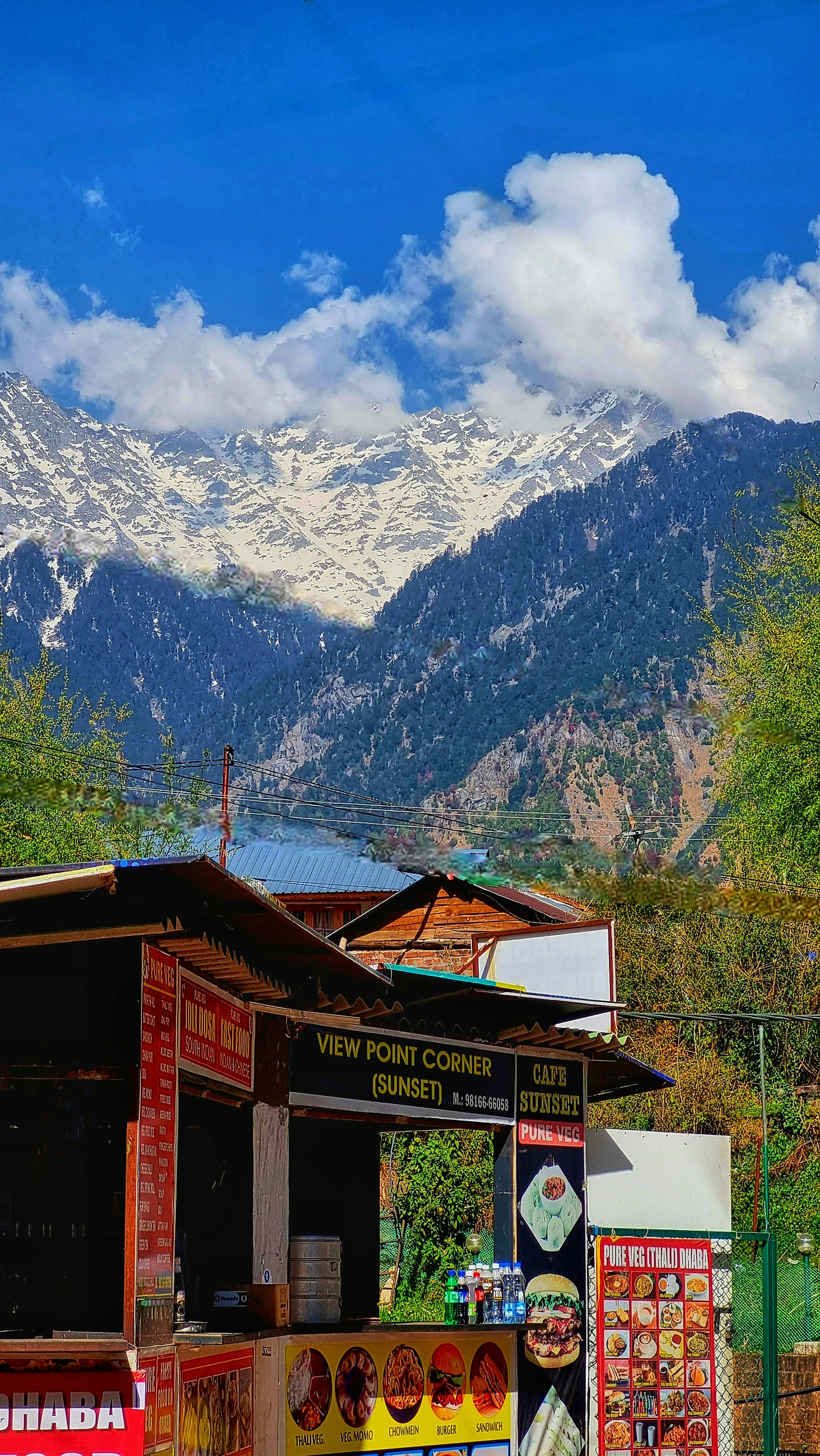 Cafe at the Foot of Snow-Capped Peaks