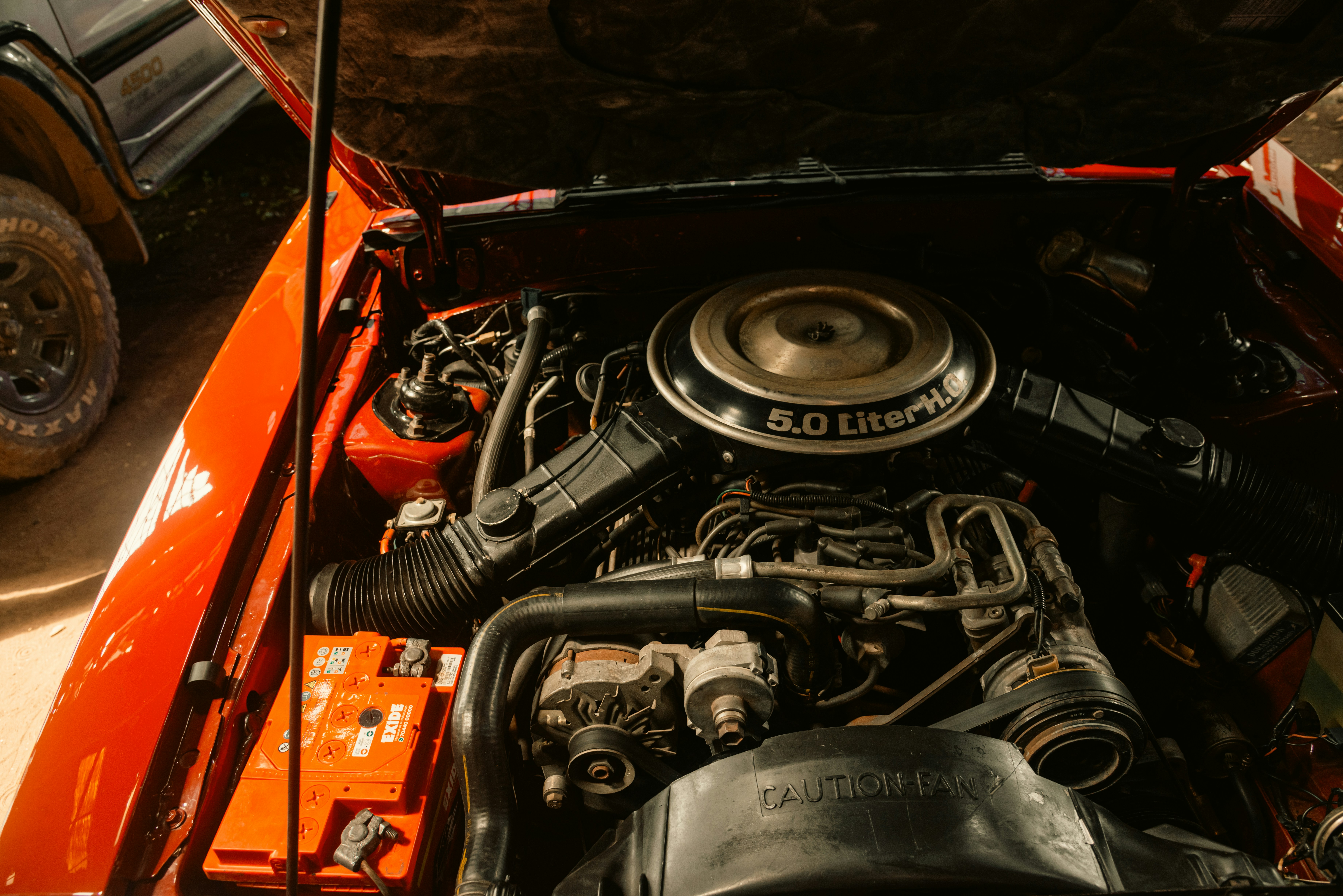 Orange Power Under the Hood: A V8 Heartbeat Revealed