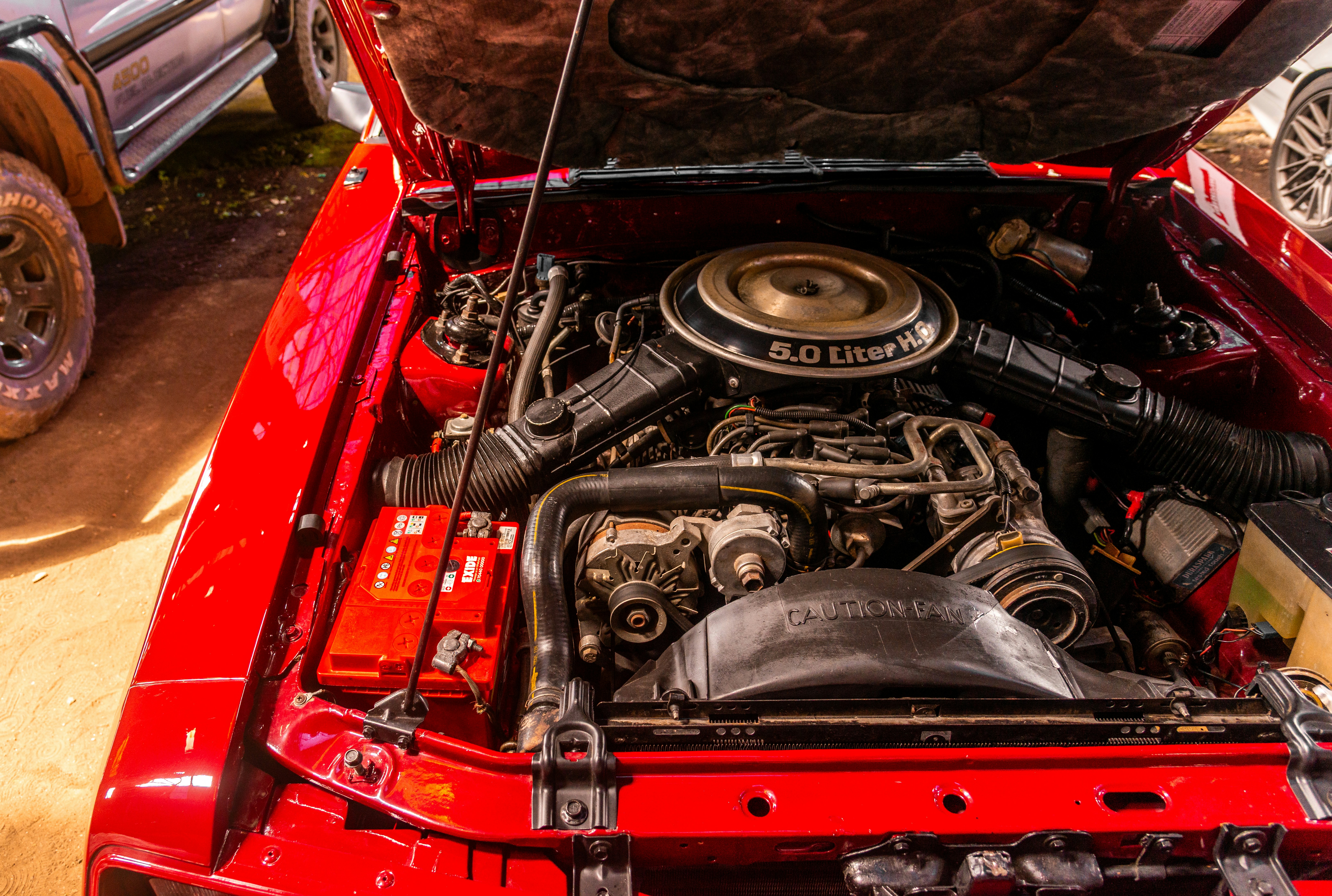 Under the Hood of a Red Muscle: Vibration, V-8, and Vintage Fire