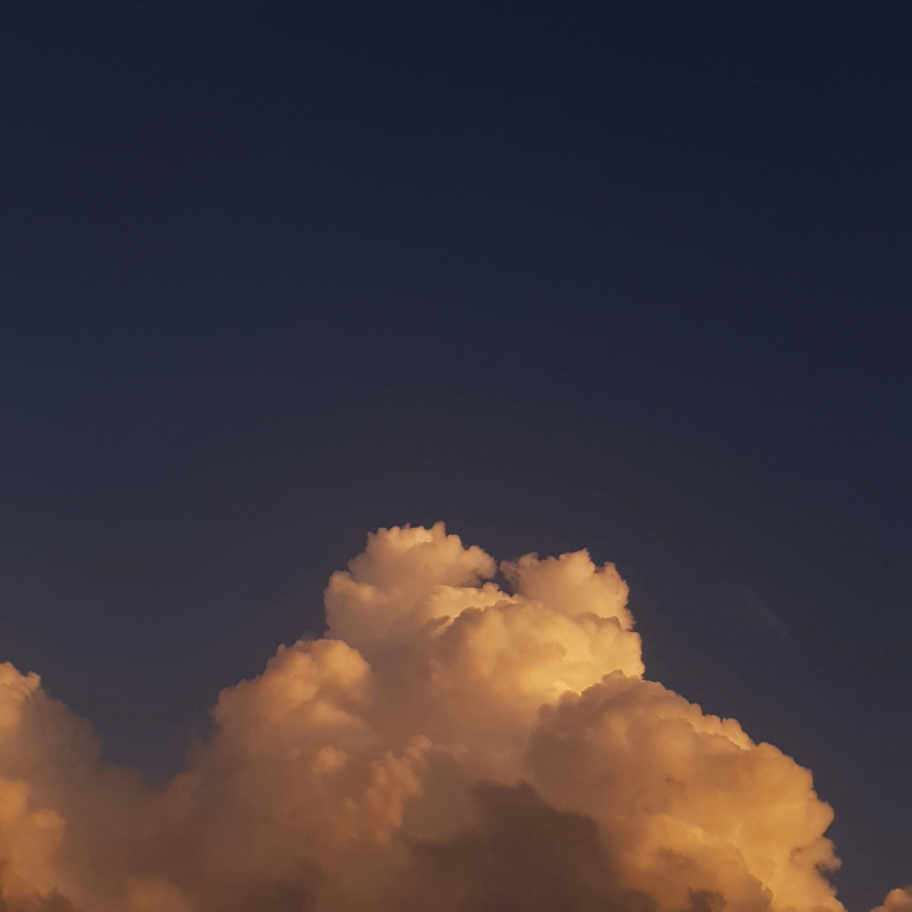 Cumulus Dawn Afloat in Quiet Twilight