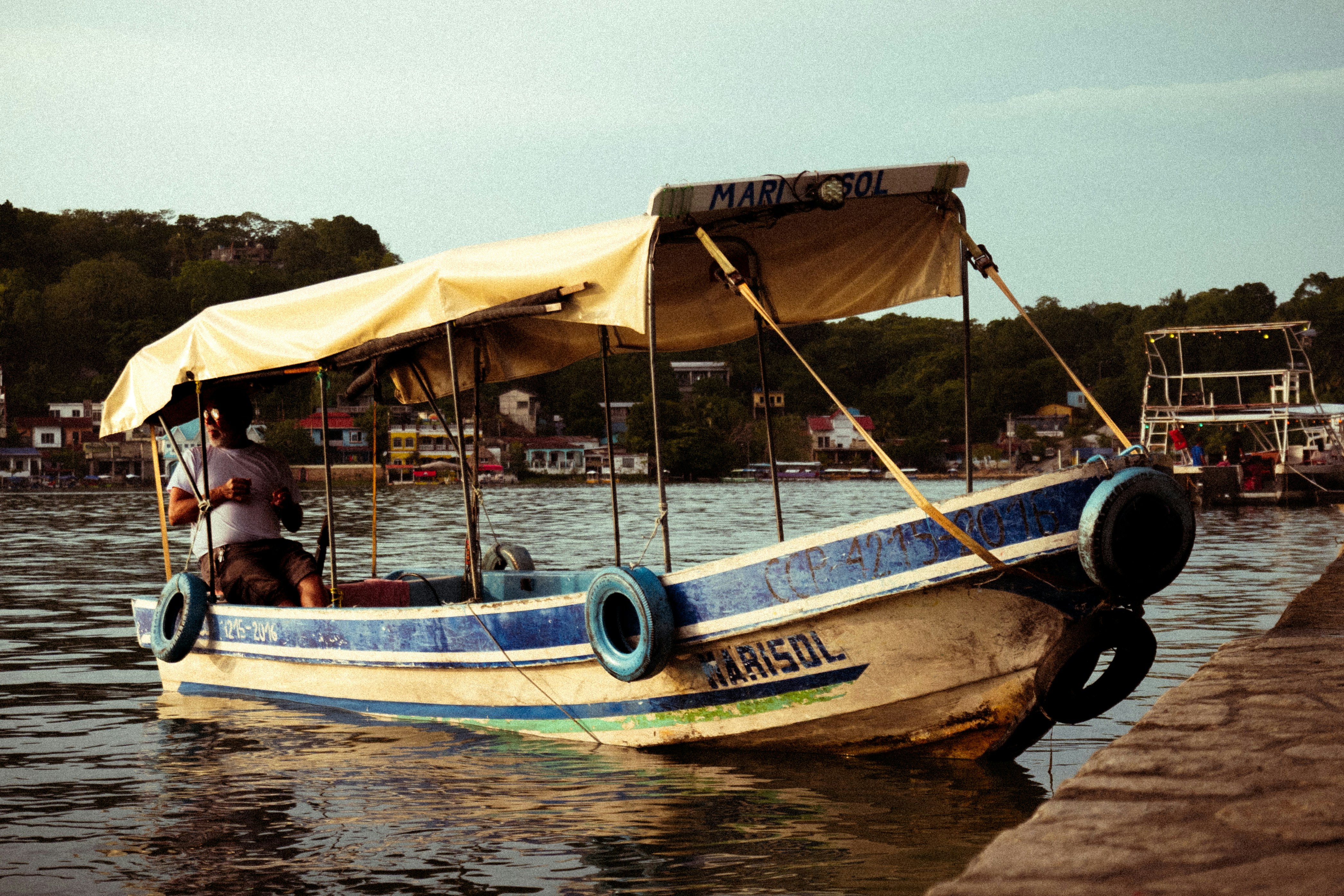 Blue-Cerulean Boat at a Calm Cay