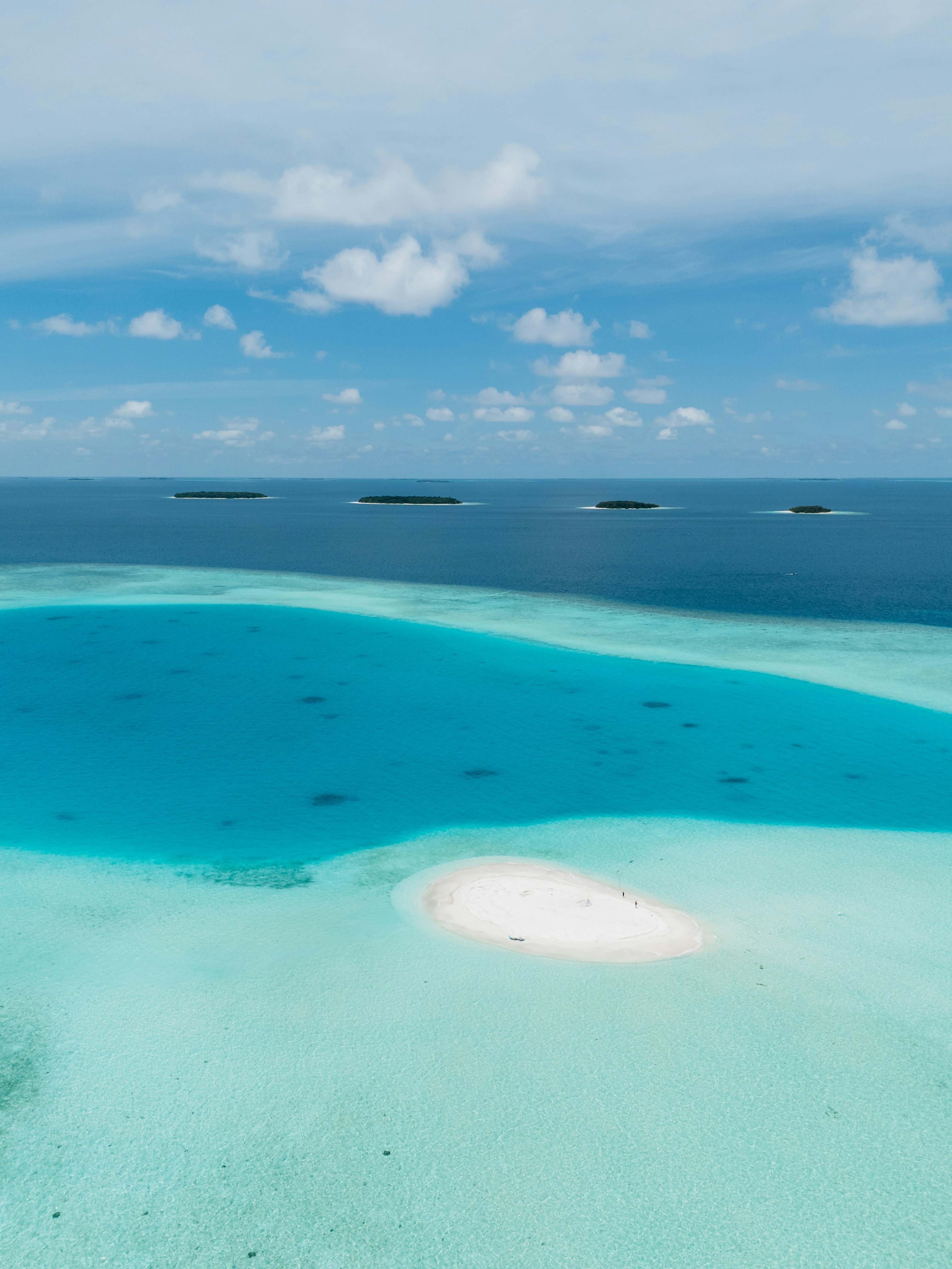 Turquoise Sands and Isolated Keys Beyond a Velvet Sky