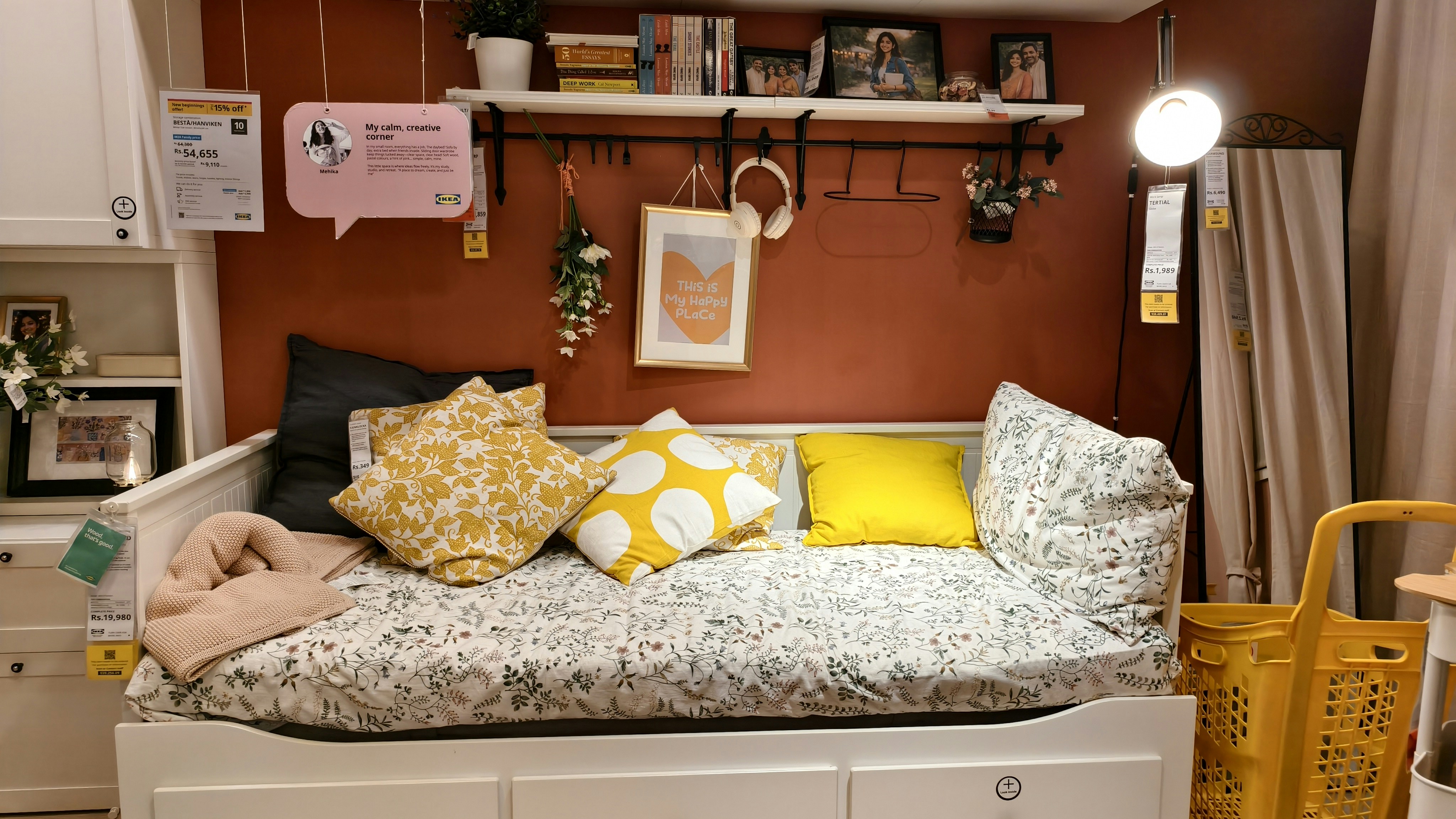 Cozy Display Bed with Sunlit Cushions in a Warm Retail Nook