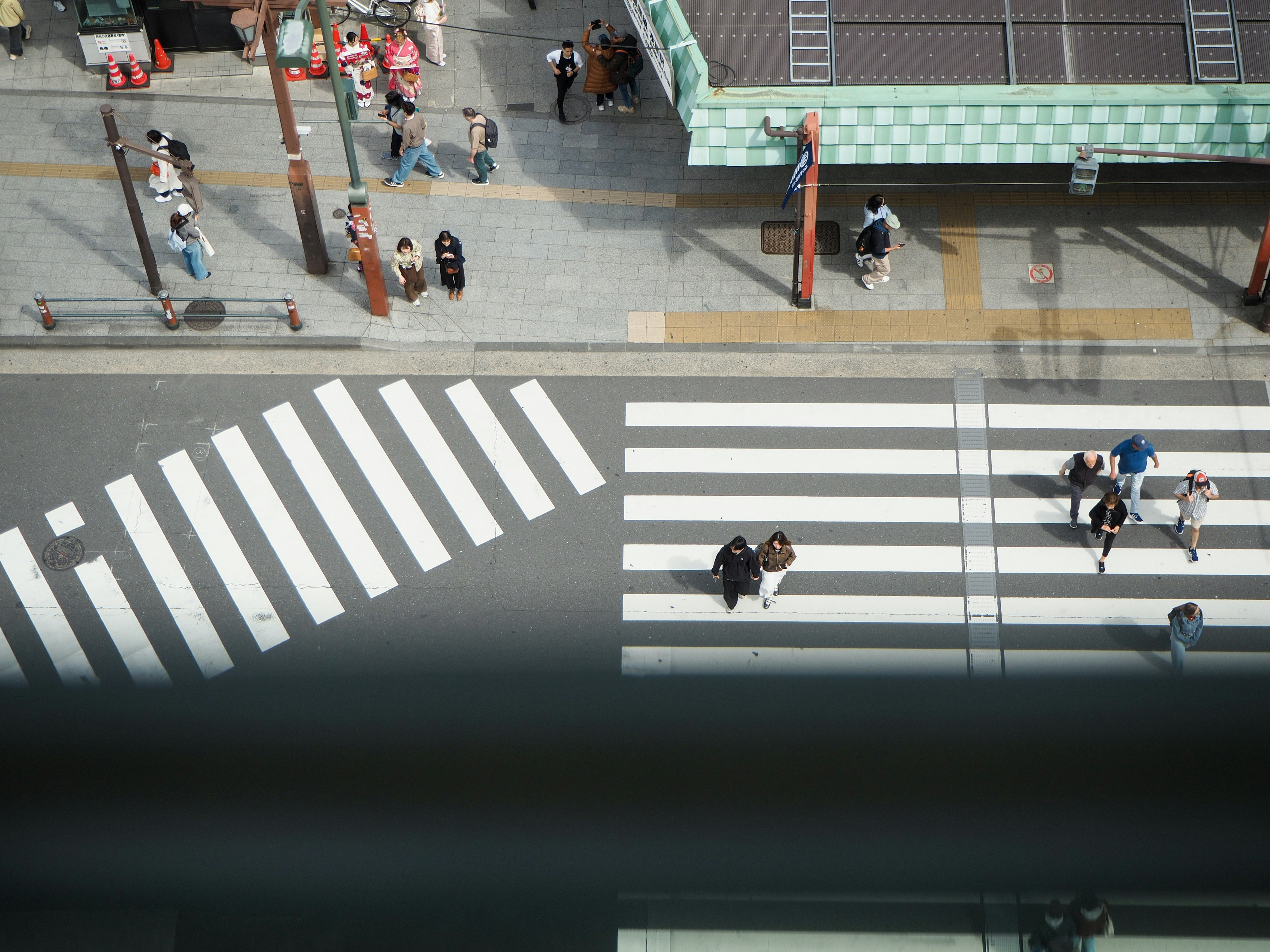Urban Crosswalk Echoes: A Bird’s-Eye Moment Over the Pedestrian Stripes