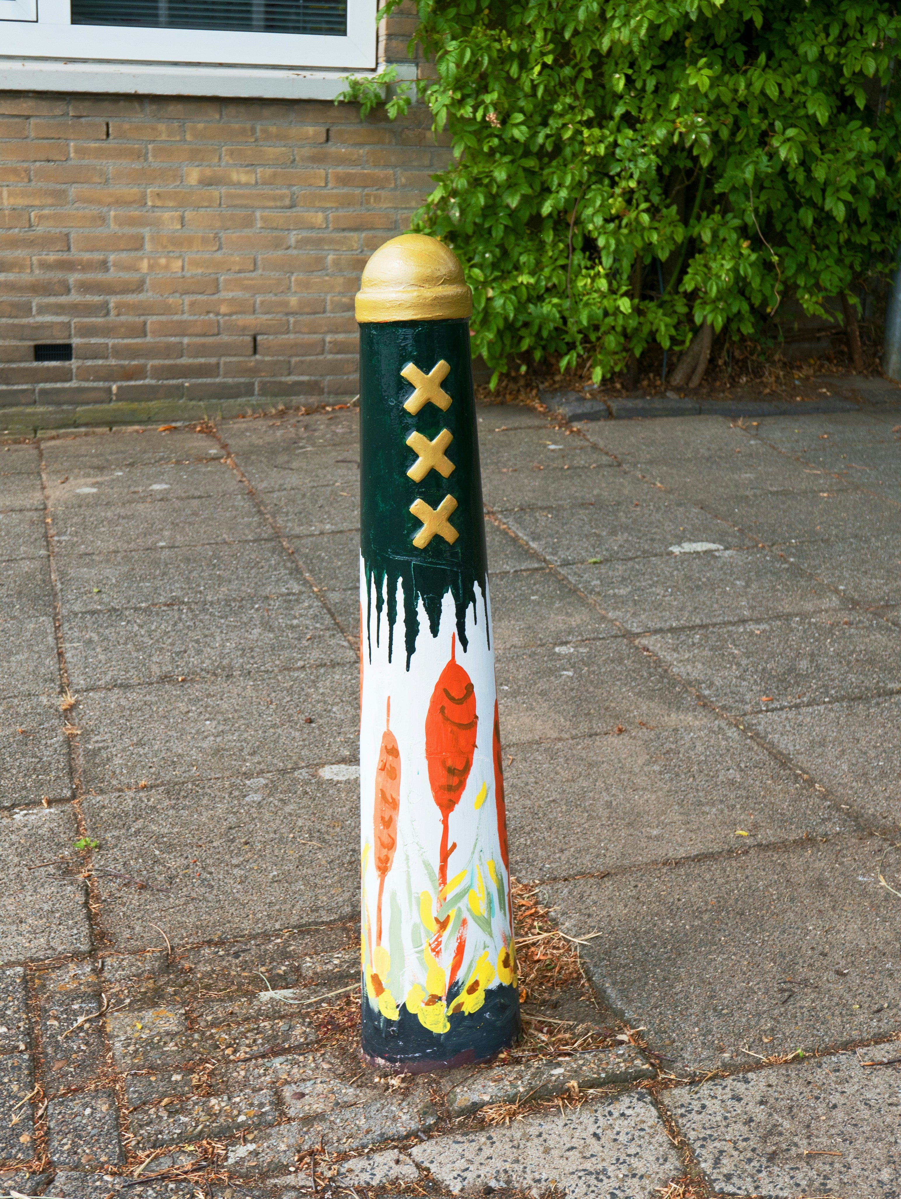 Painted Pedestal in a City Walkway