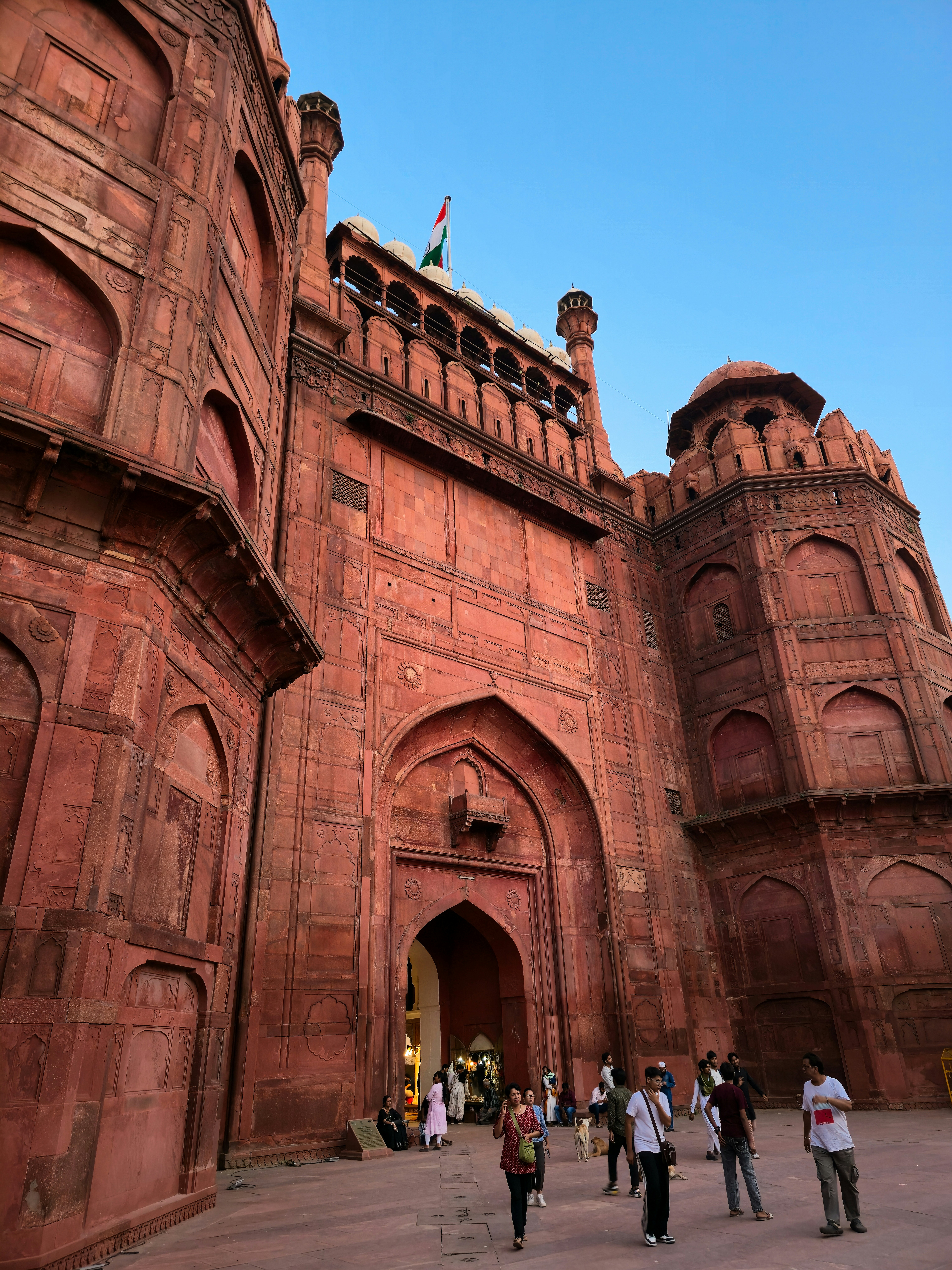 Gilded Gateway: Red Fort-like Facade Under a Clear Jaipur Sky