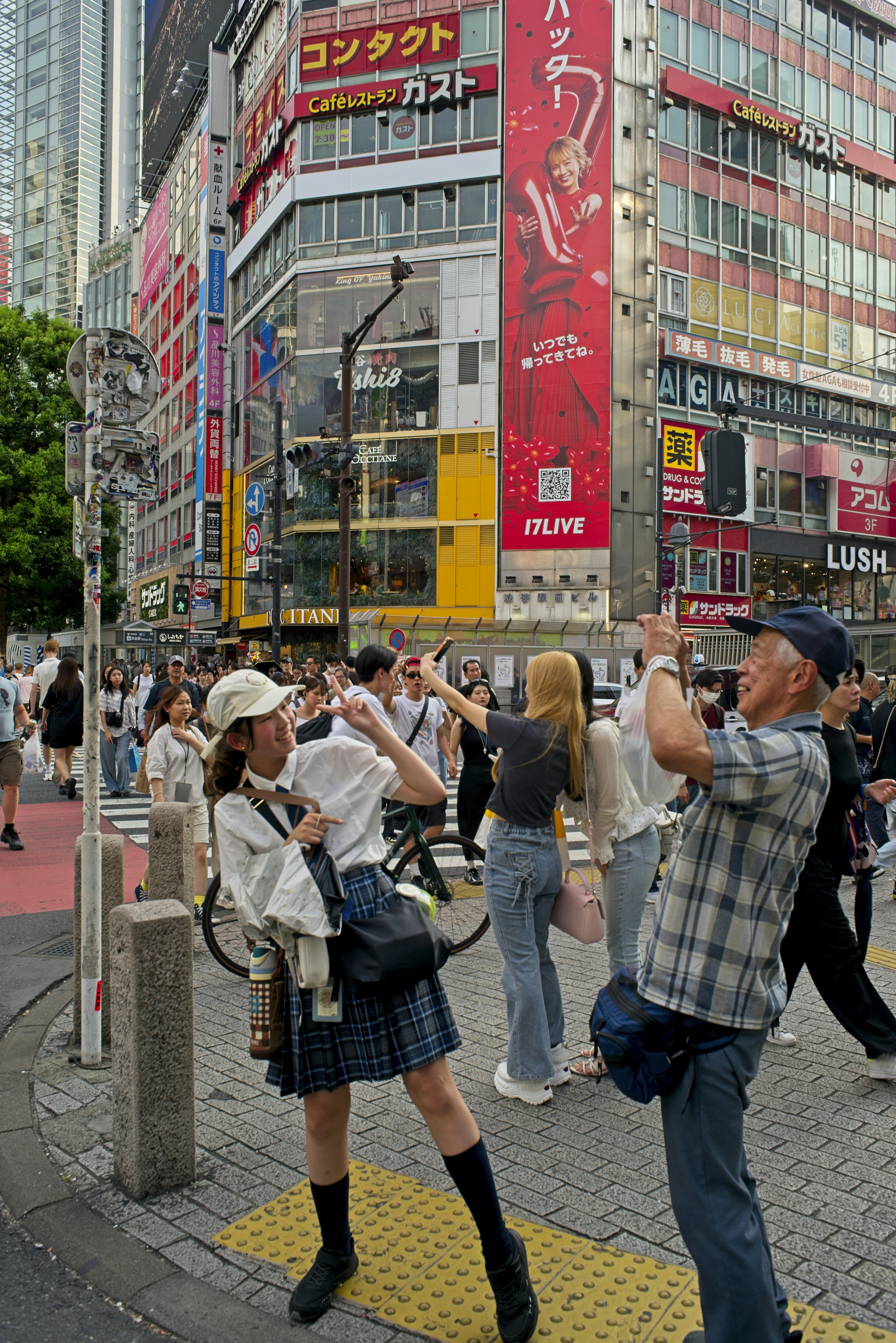 Tokyo Crosswalk: A Moment of Playful Pose in a Neon Sea