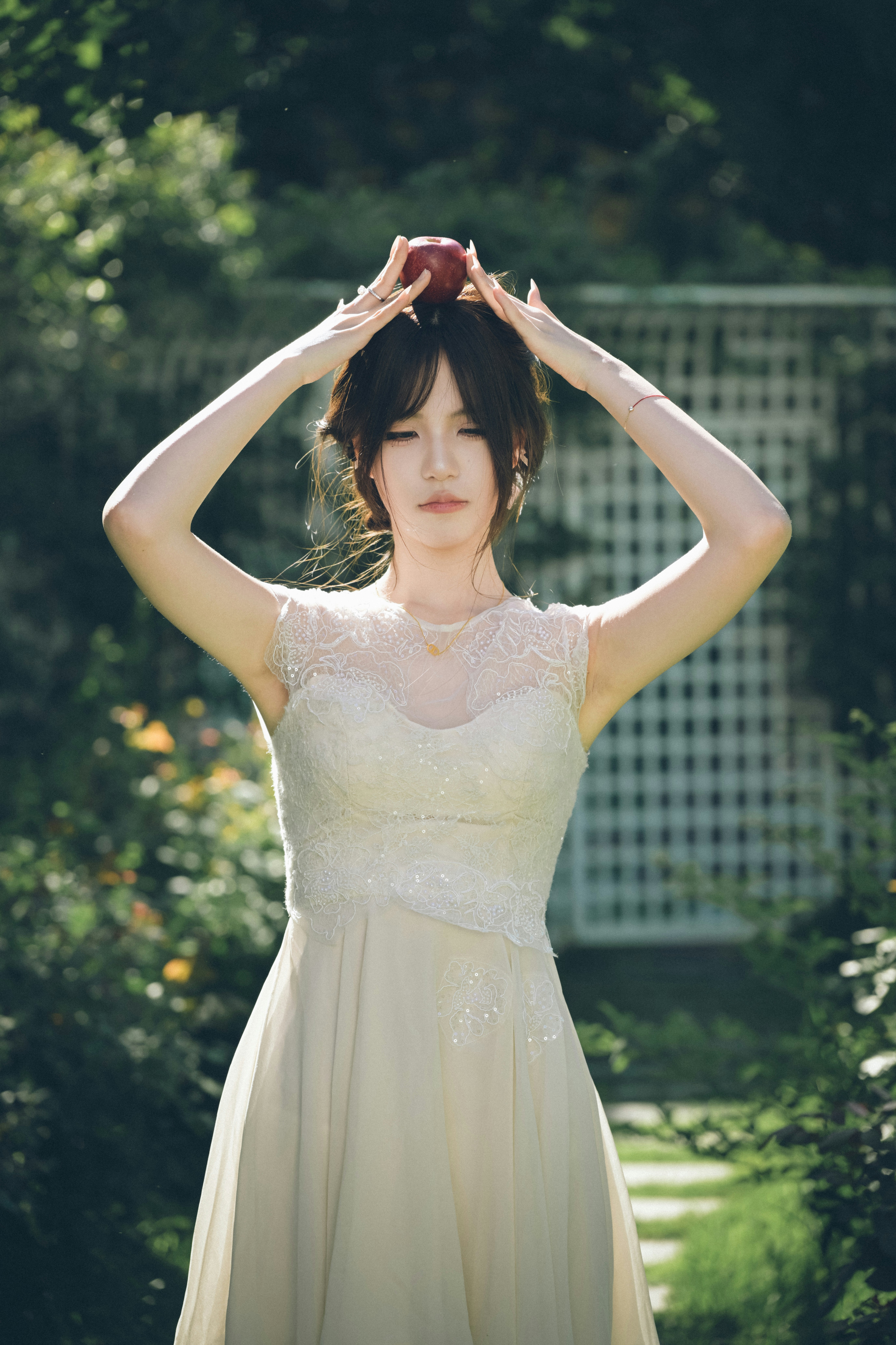 Bride in Sunlit Garden: Apple Crown on Silken Veil