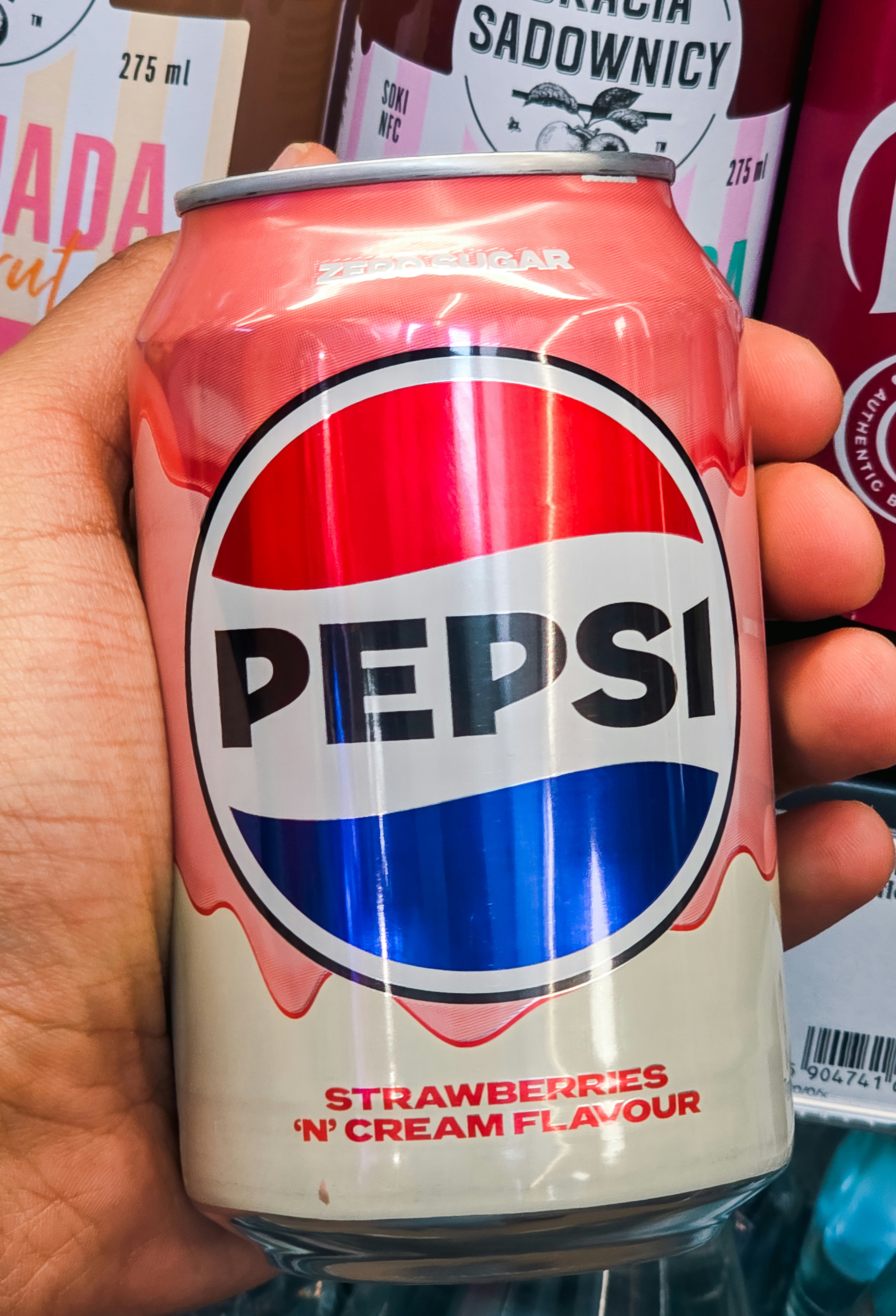 Pepsi can in hand: vibrant retro cola moment
