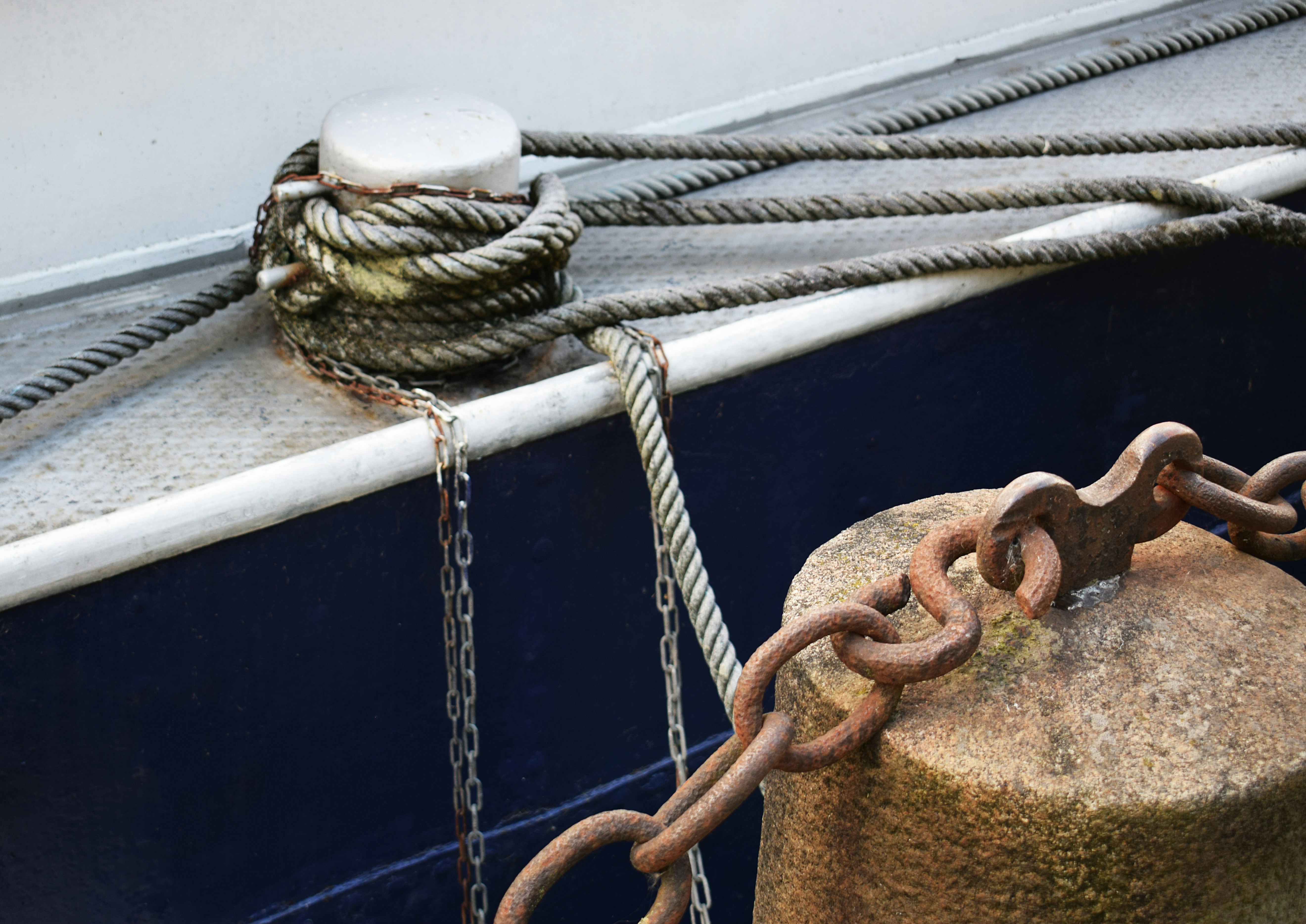 Rope and Chain at the Dock: A Quiet Tangle by the Bow