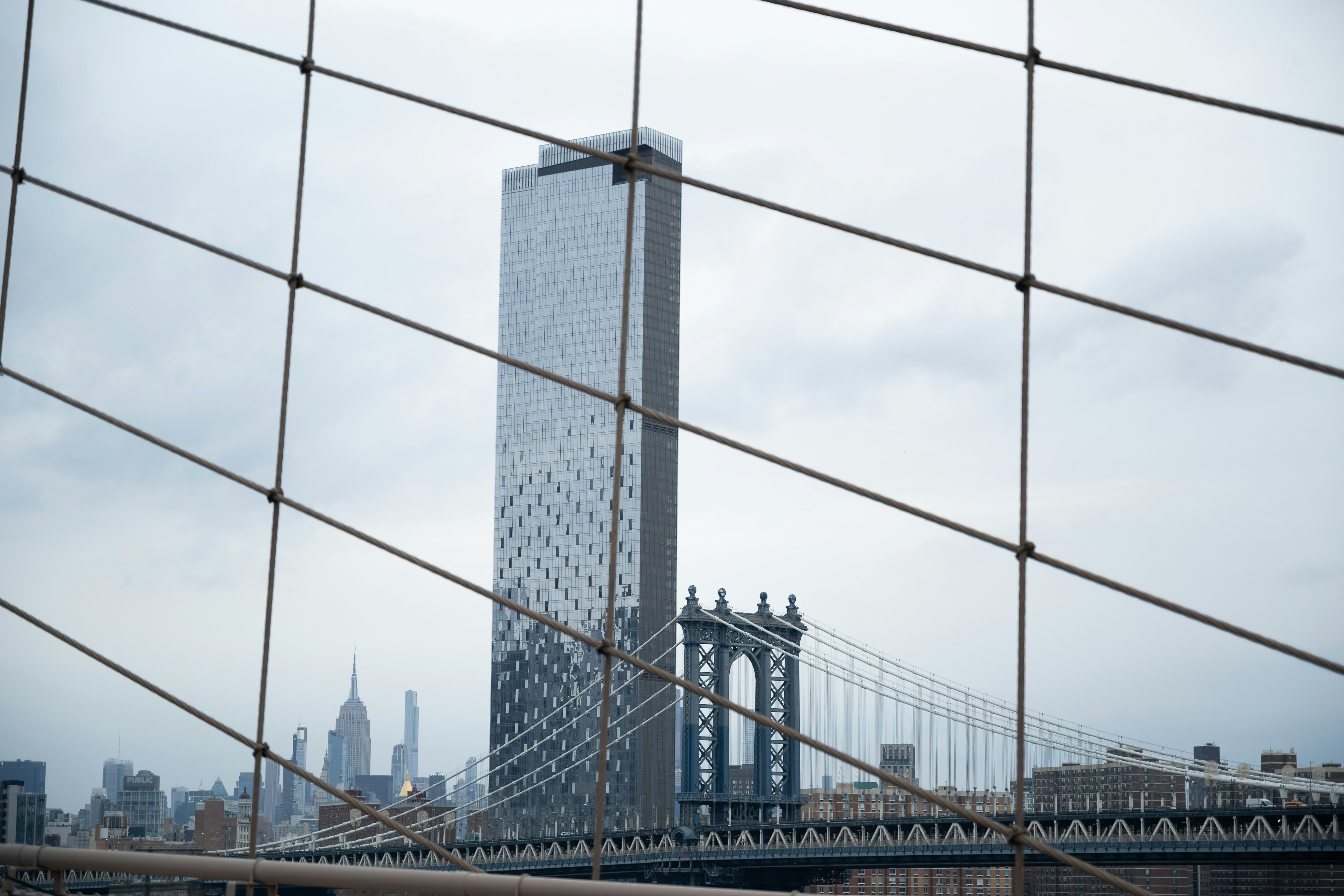 Gridlines and Towers: The Bridge View through a Geometric Window