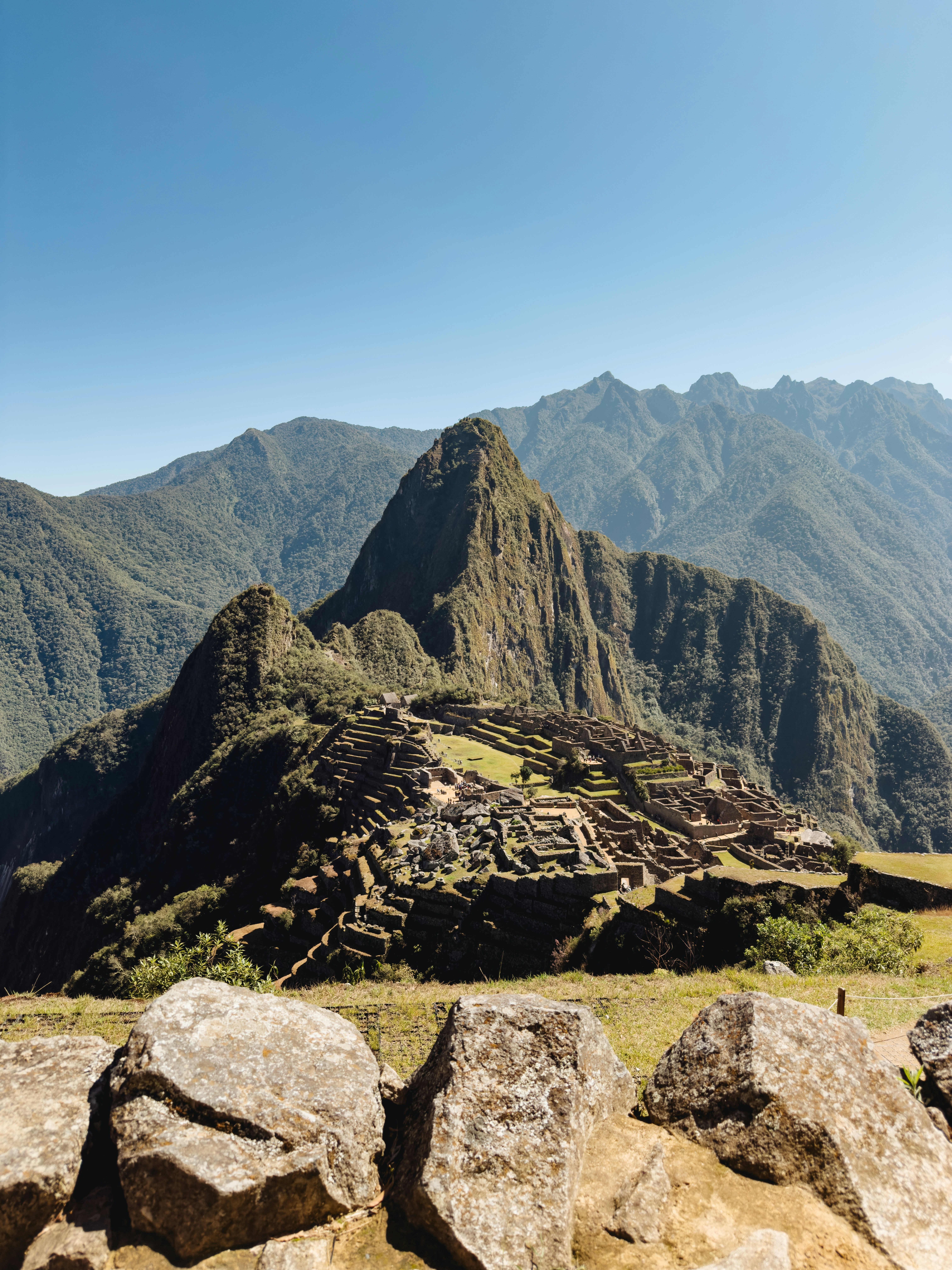 Sun-Shared Summit: Terraced Ruins Meet Sky-Blue Horizon