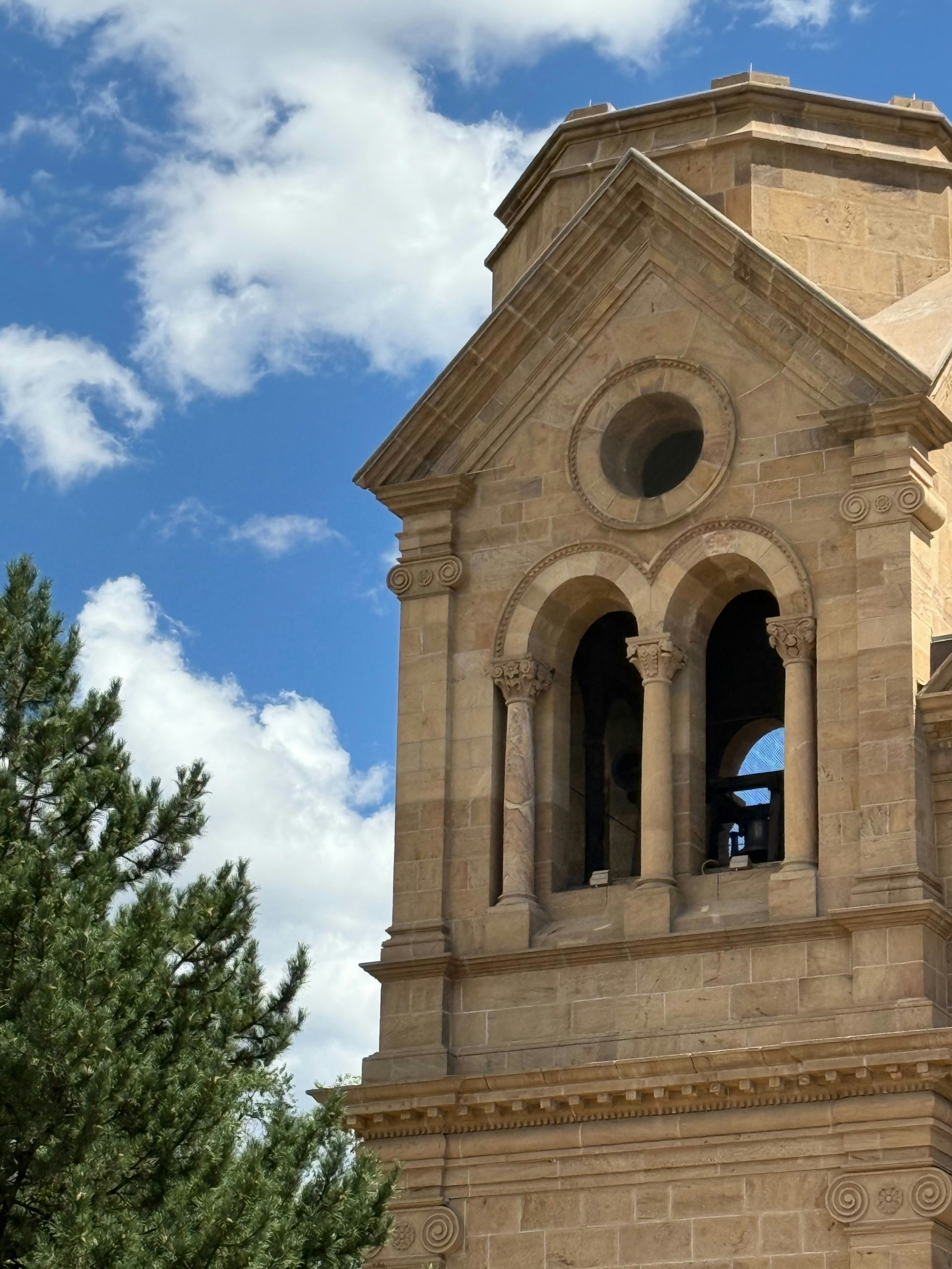 Temple Bell Tower Reaching Toward a Bright Sky