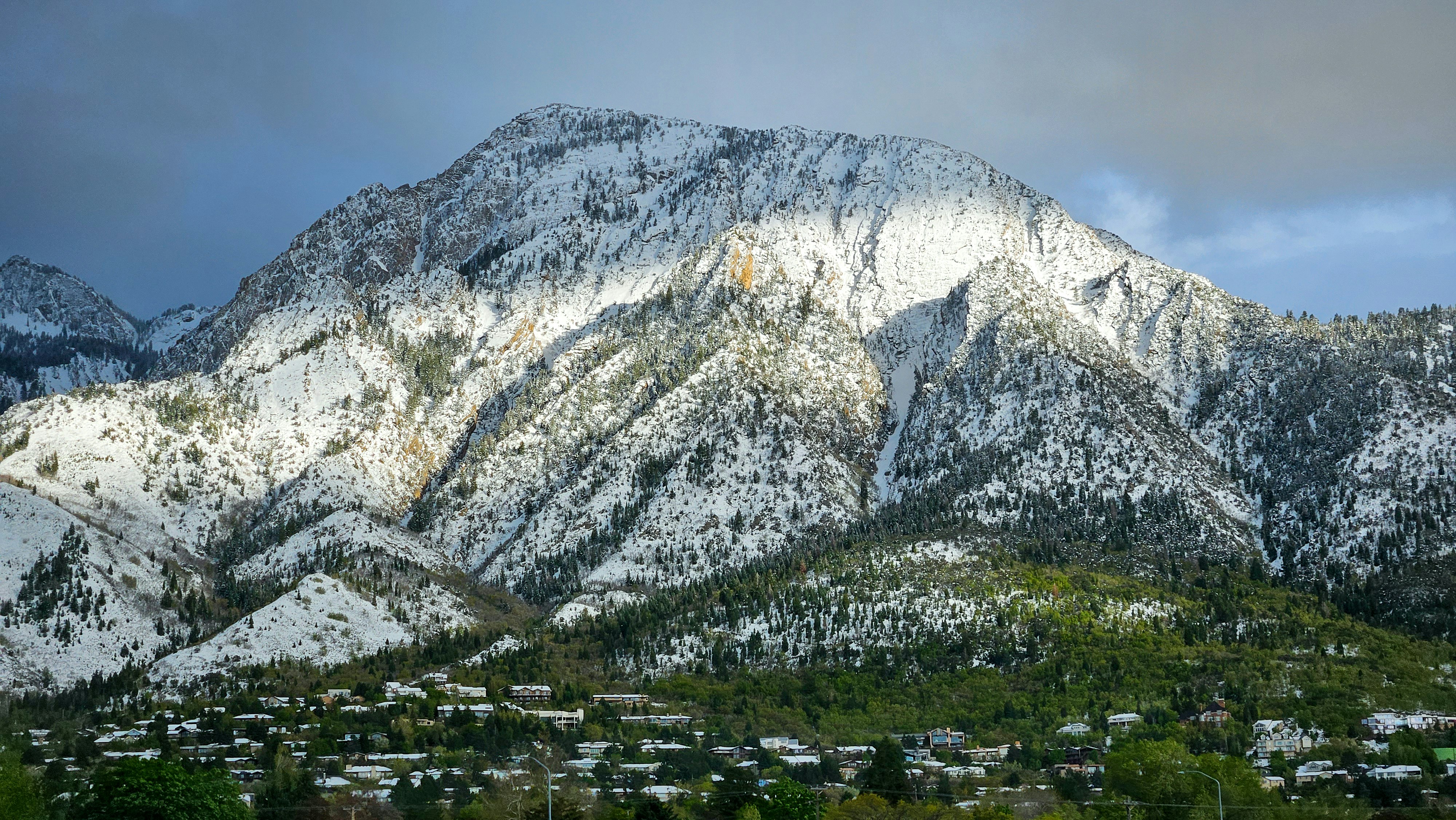 Snow-Capped Peaks Over a Quiet Village