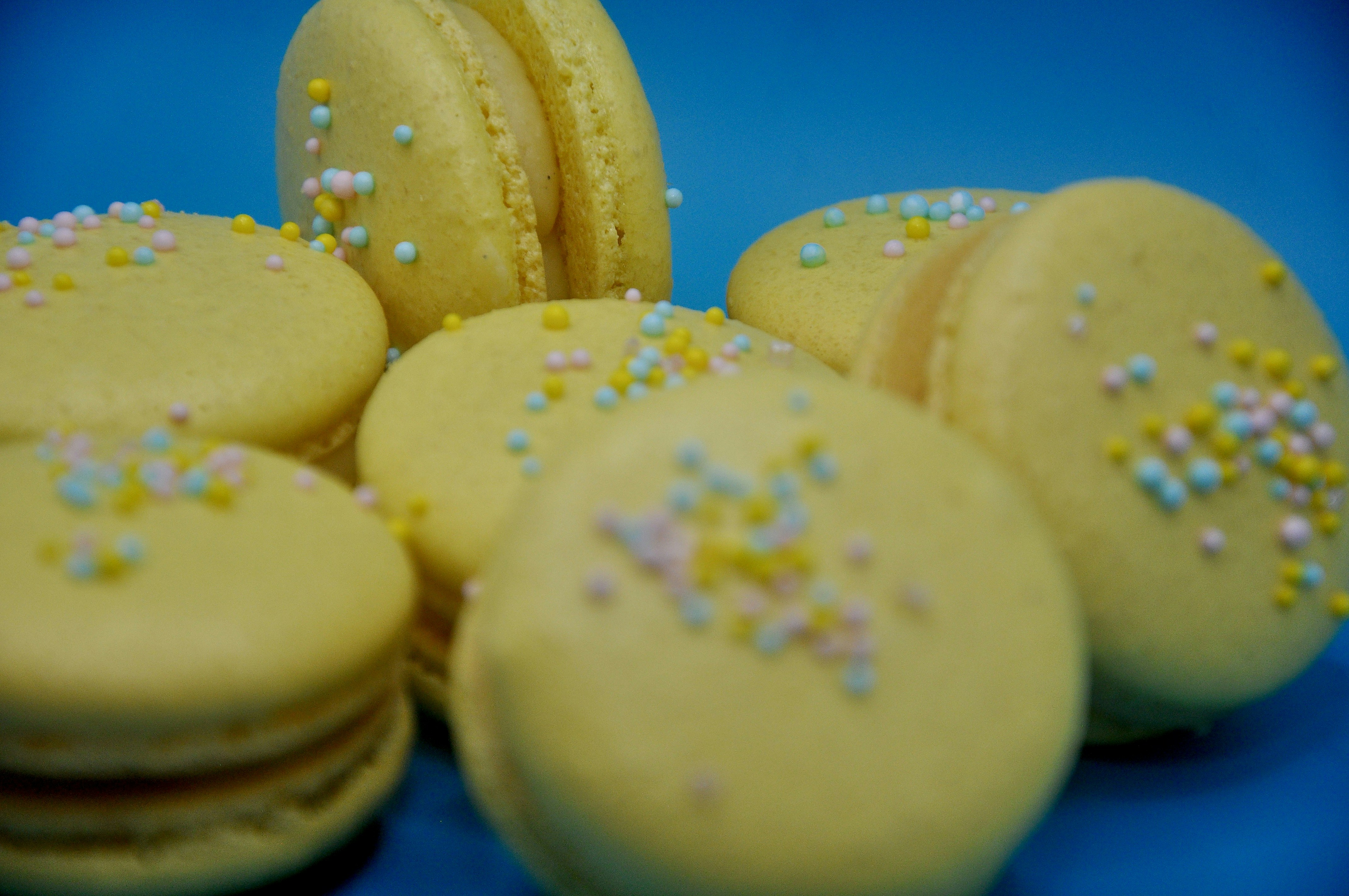 Golden Macarons in a Soft Spotlight