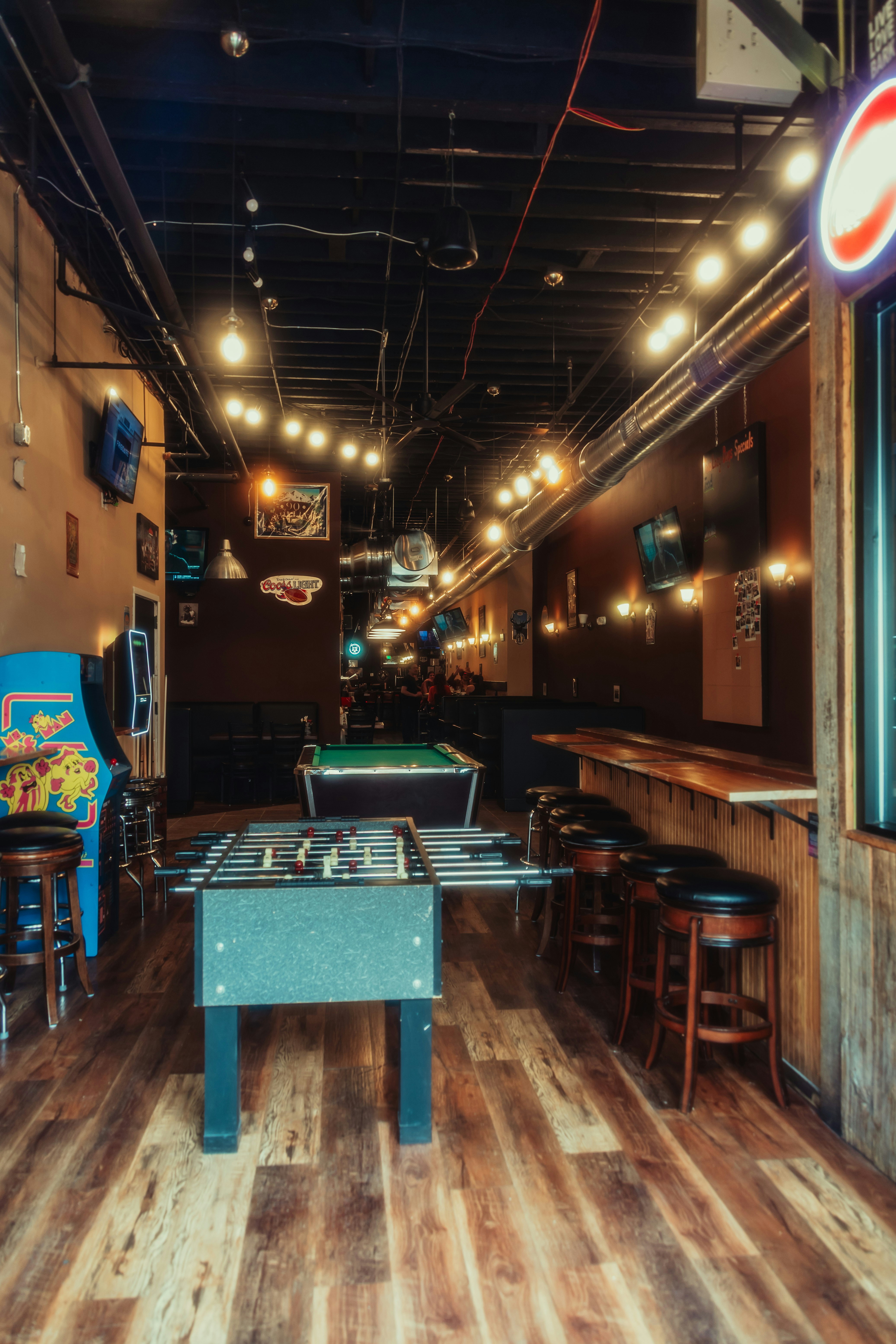 Arcade Spotlight: Foosball Alley in a Dim Neon Haven