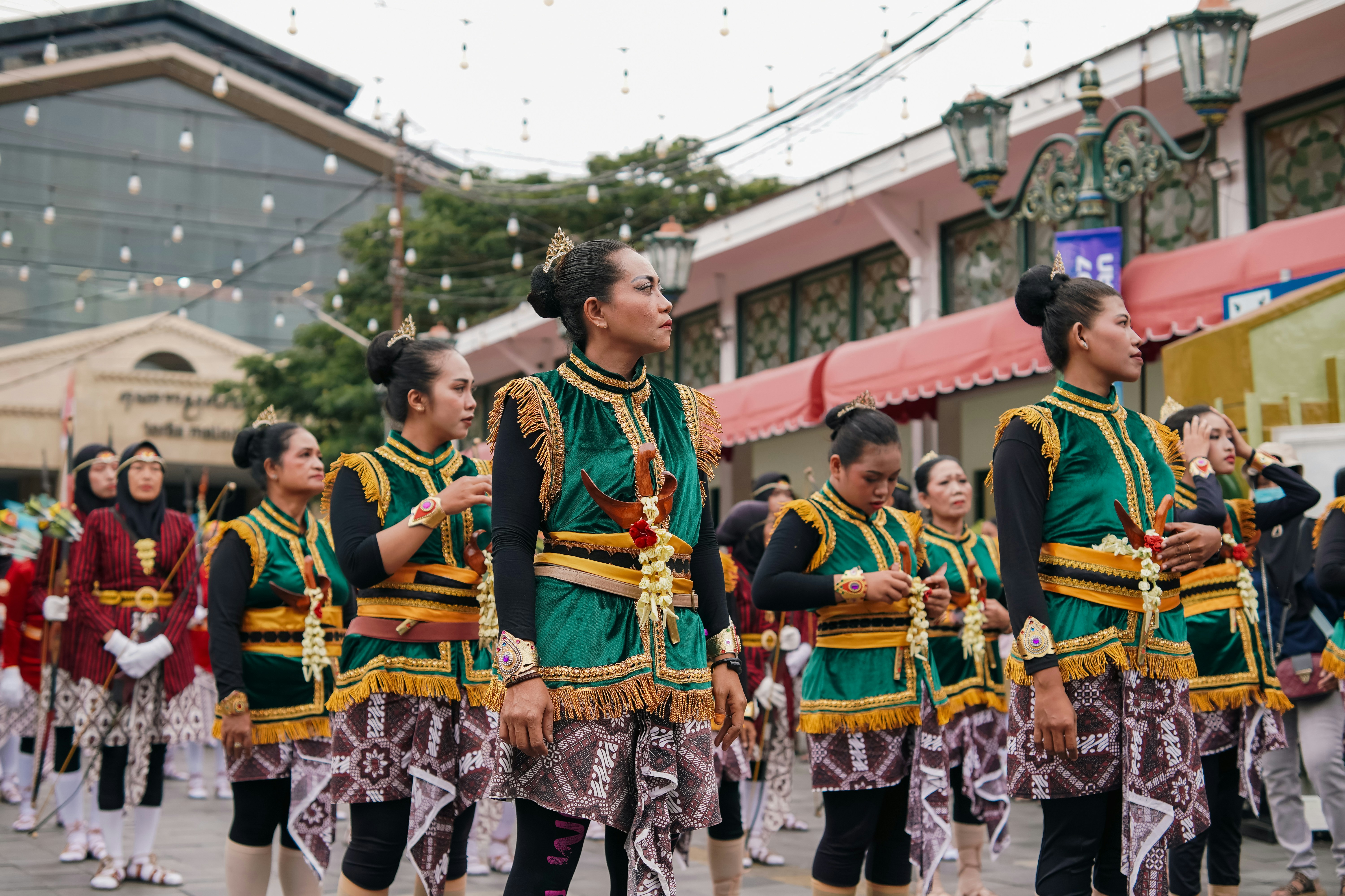 Dance of Emerald Uniforms under Festive Lights