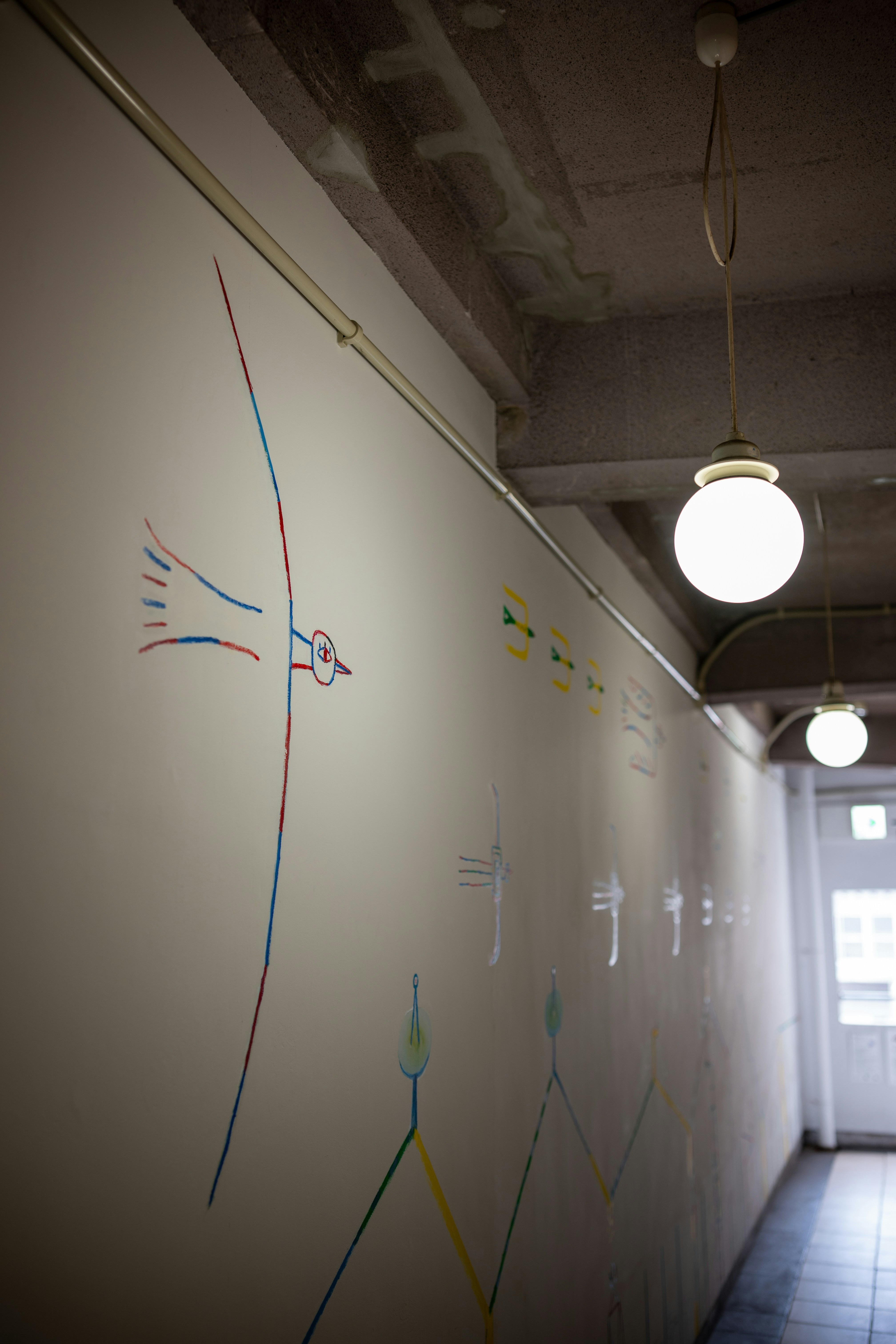 Fluorescent Orbits: A Gallery Hallway with Distant Light