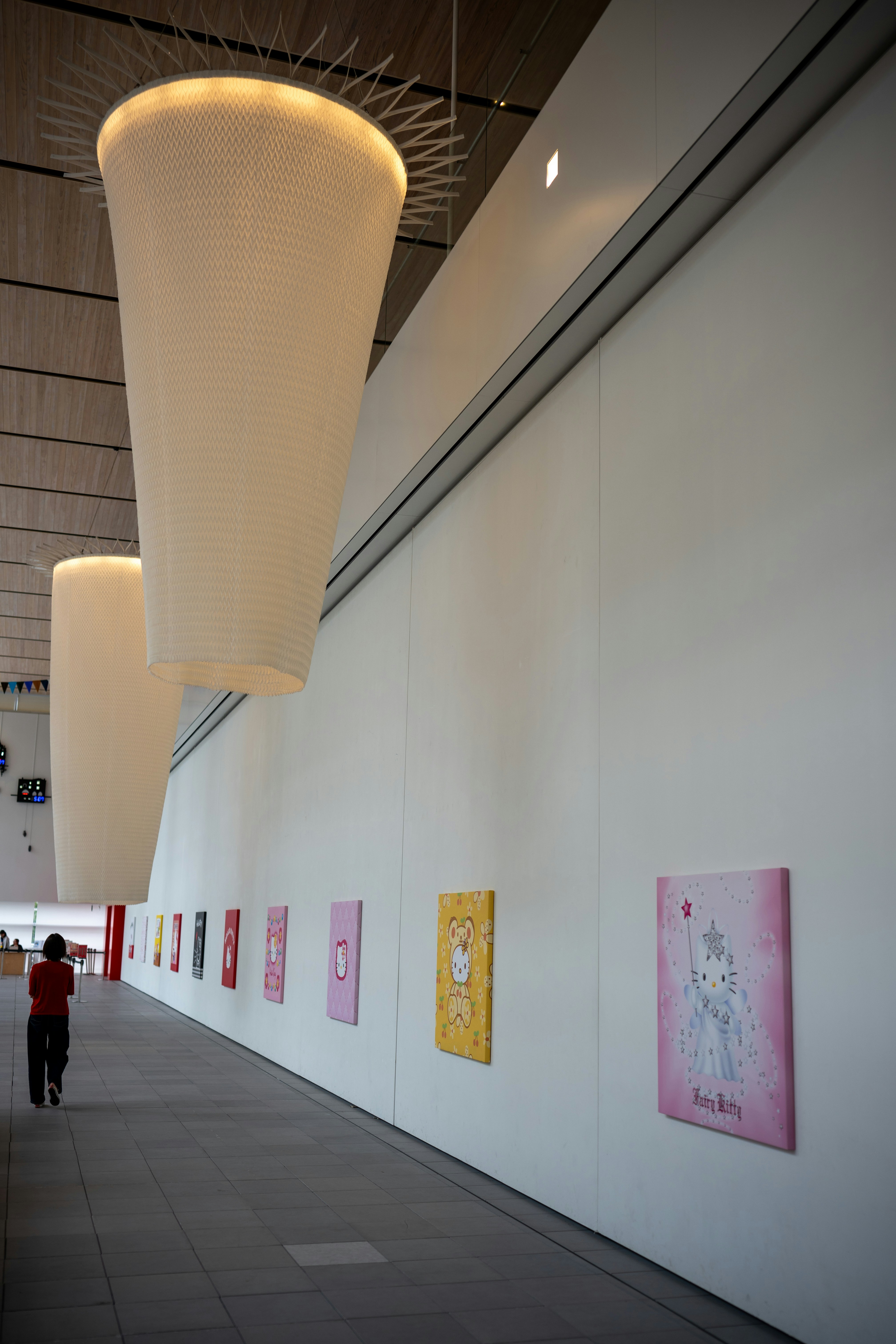 Soft Luminaries and Artful Hallway: A Quiet Gallery Walk