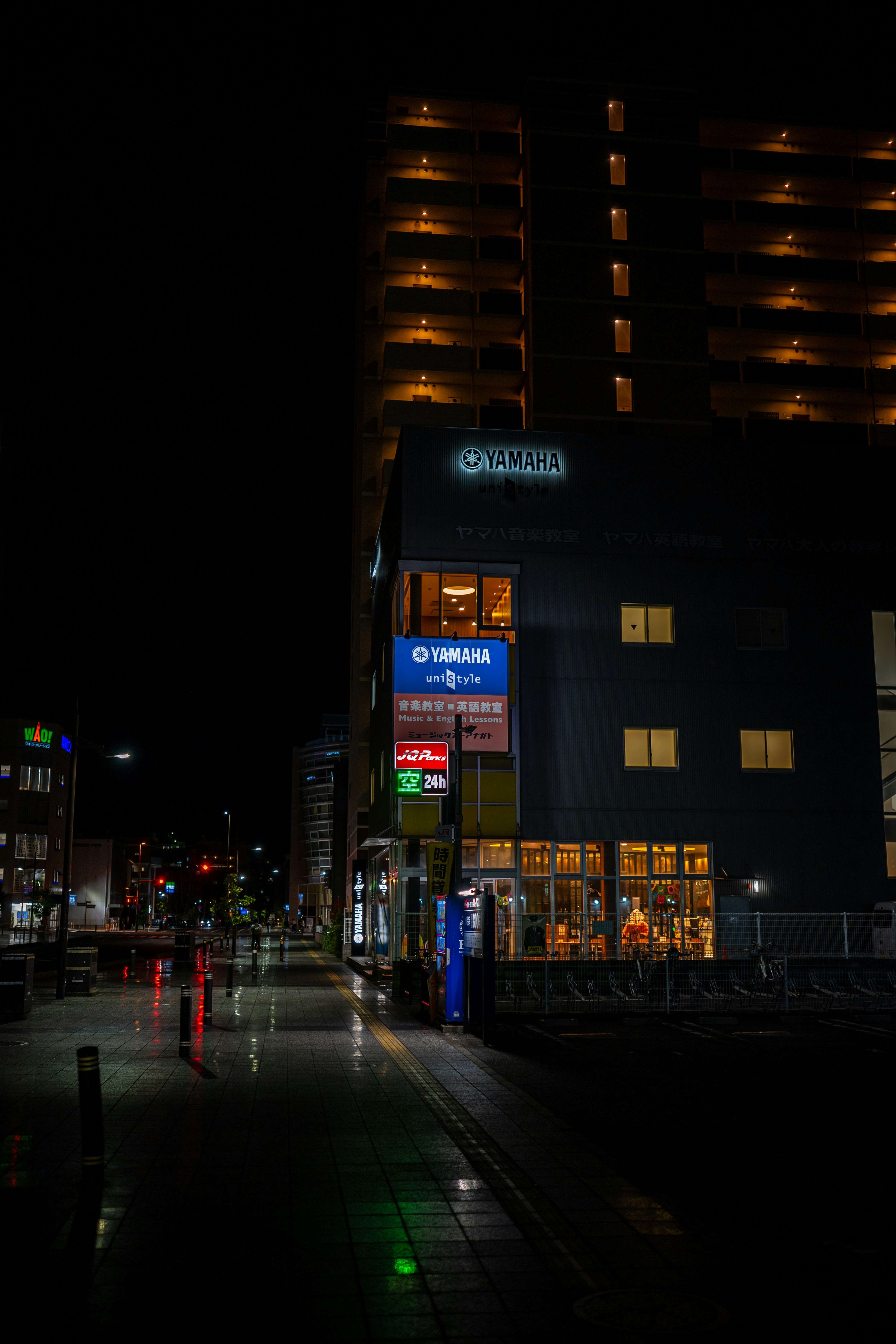 Neon Corridor: Nightlife at the Yamaha Sign