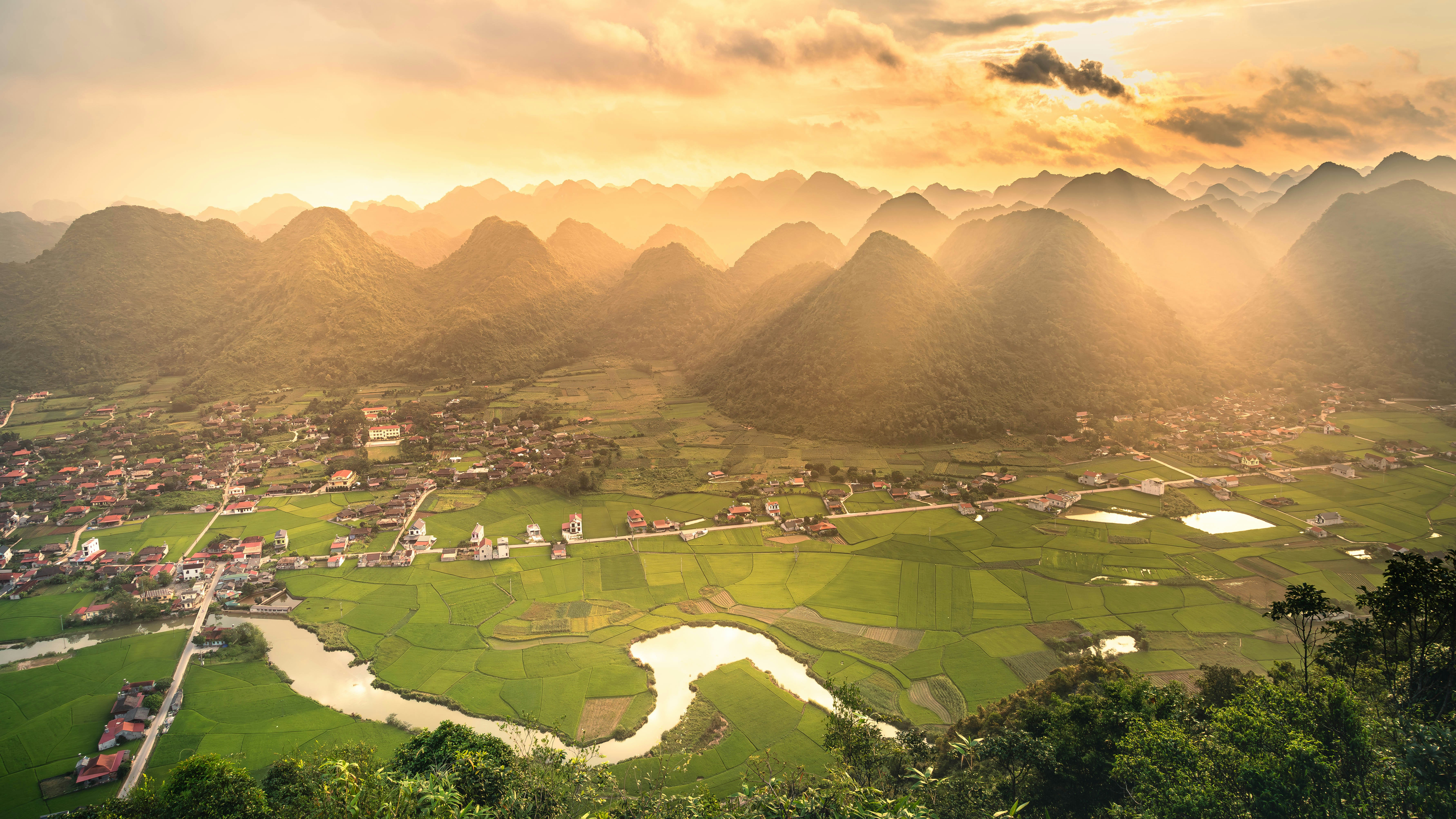 Golden Veil Over the Valley: Sunbreak Through Mountain Mist