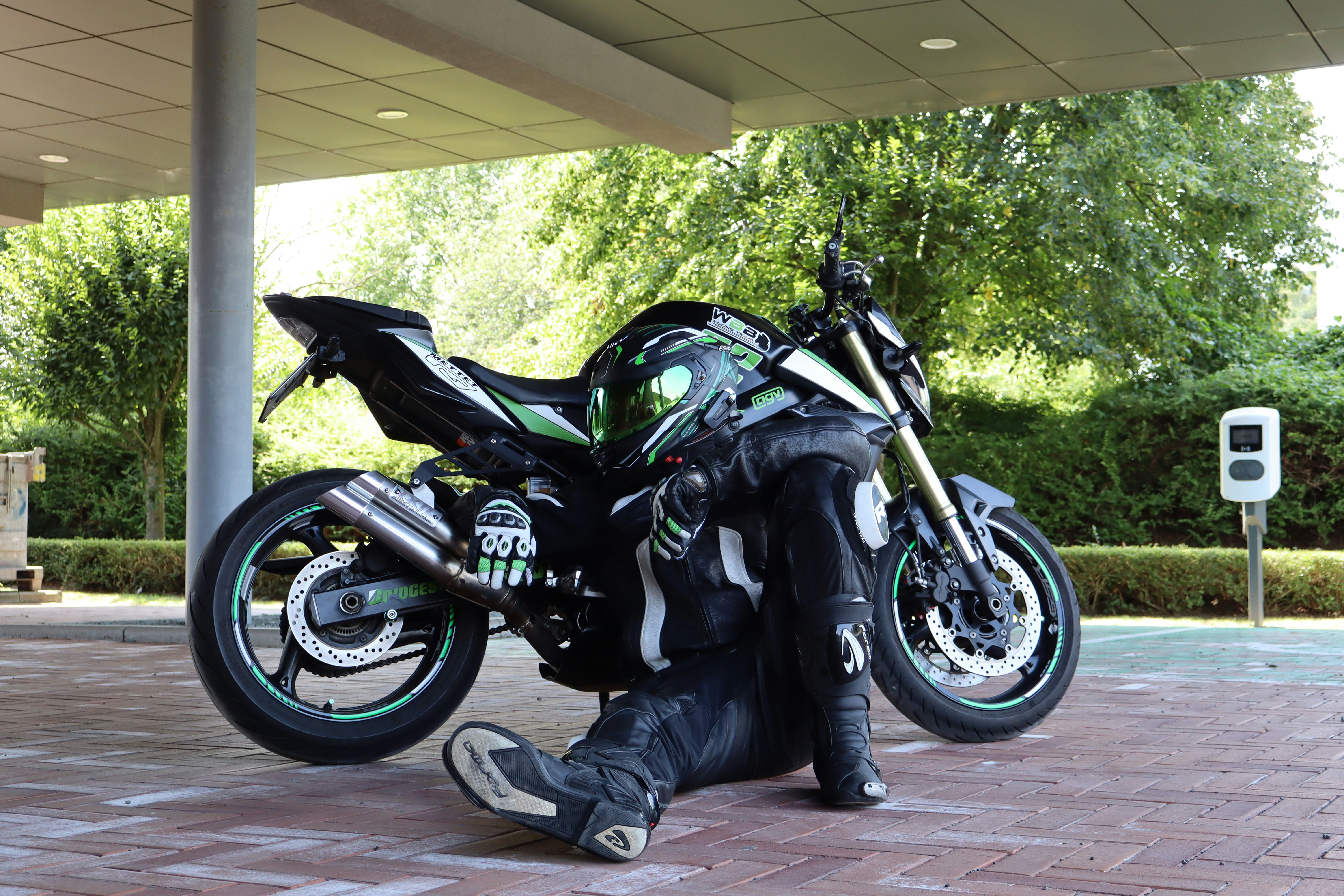 Resting on Chrome: a sportbike under a sheltered canopy