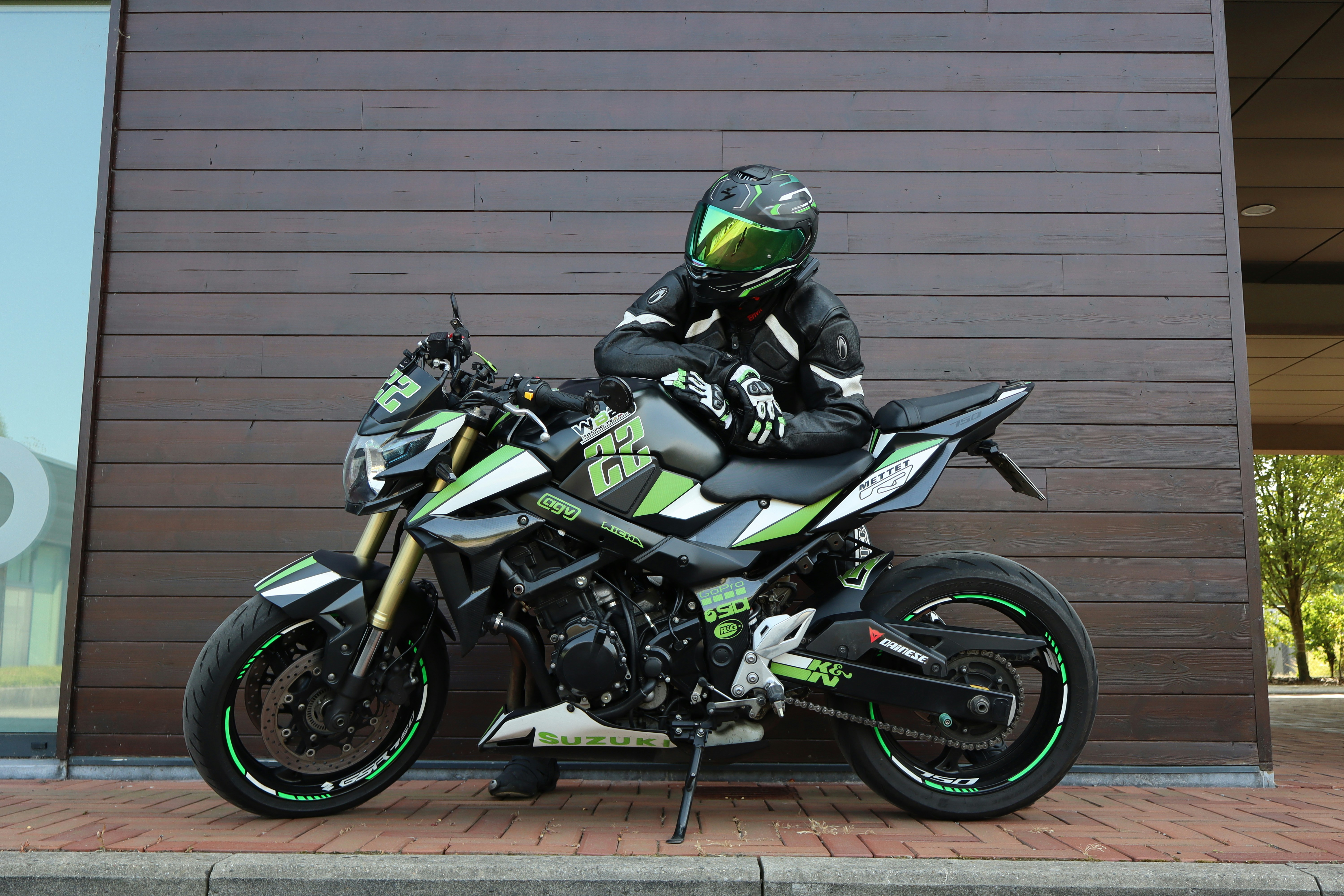 Green-axis Rebel: A rider poised on a neon-accented street sportbike