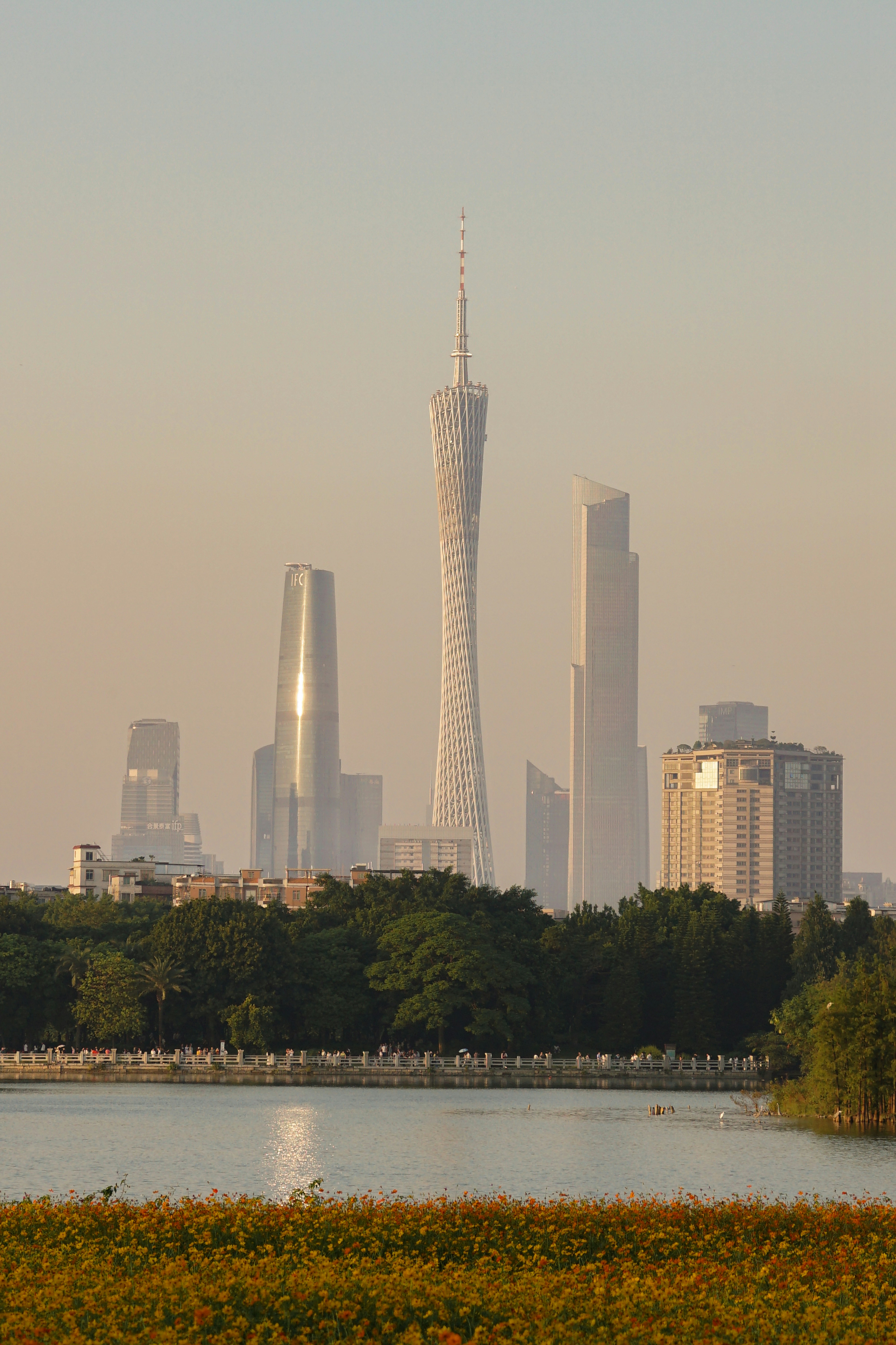 Silhouette of a Modern Skyline Rising Over a Quiet Lake